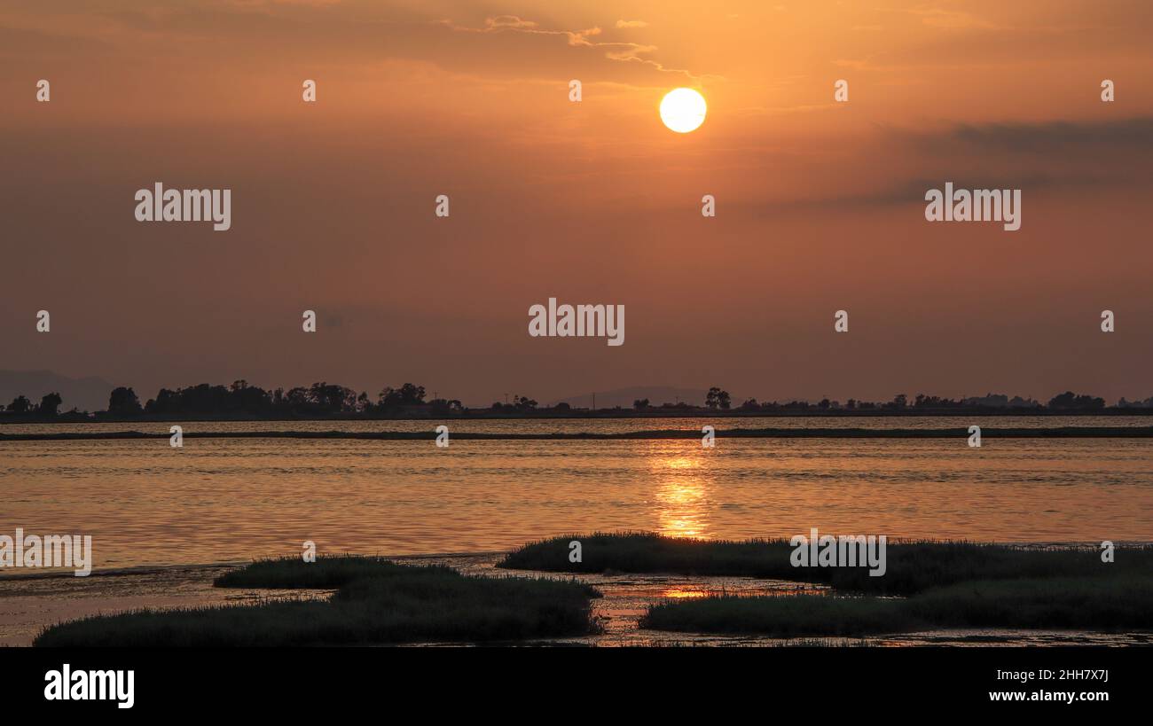 Sunset at the lagoon of Mesologgi,Aitoloakarnania,Greece Stock Photo ...