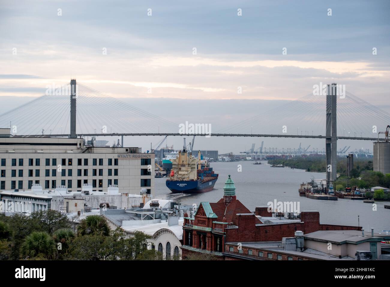 A large container ship sailing into the port of Savannah, GA Stock ...