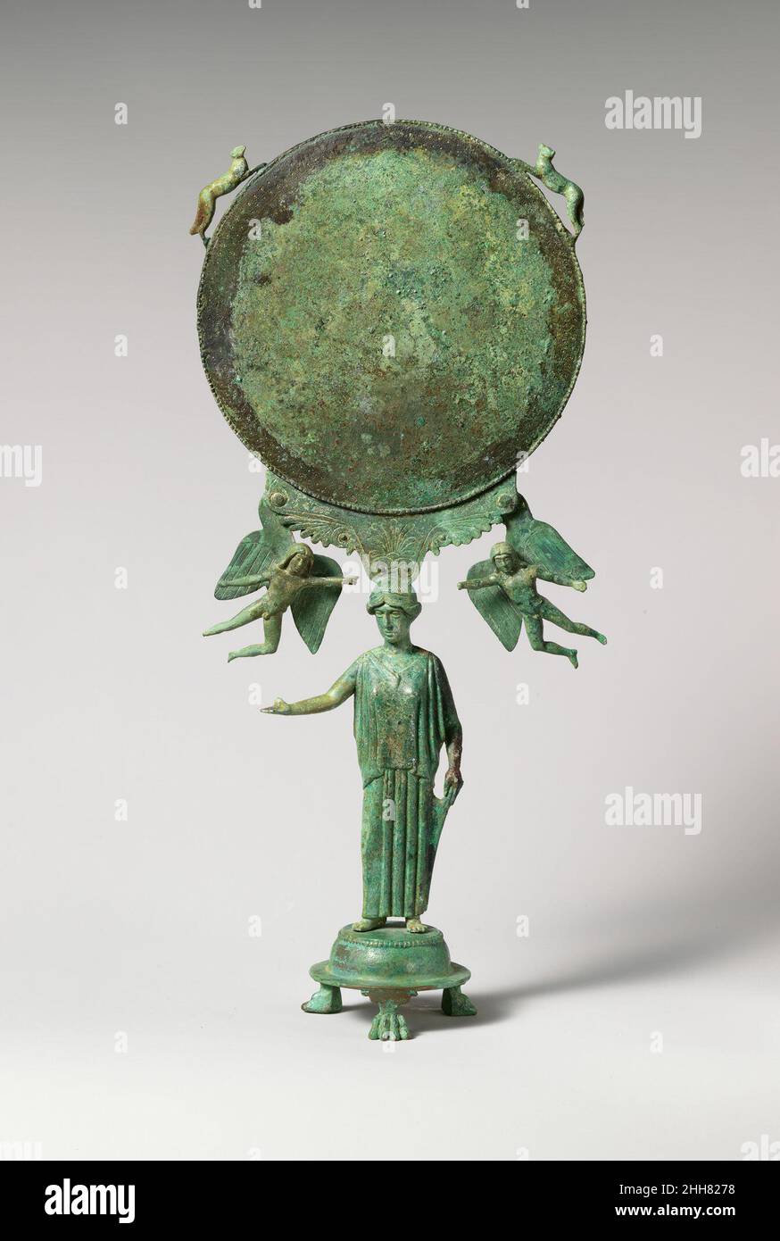 Bronze mirror with a support in the form of a draped woman mid-5th ...