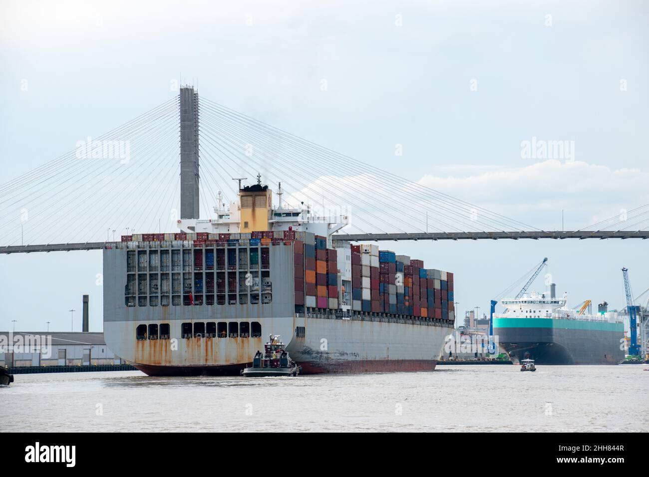 A large container ship sailing into the port of Savannah, GA Stock ...