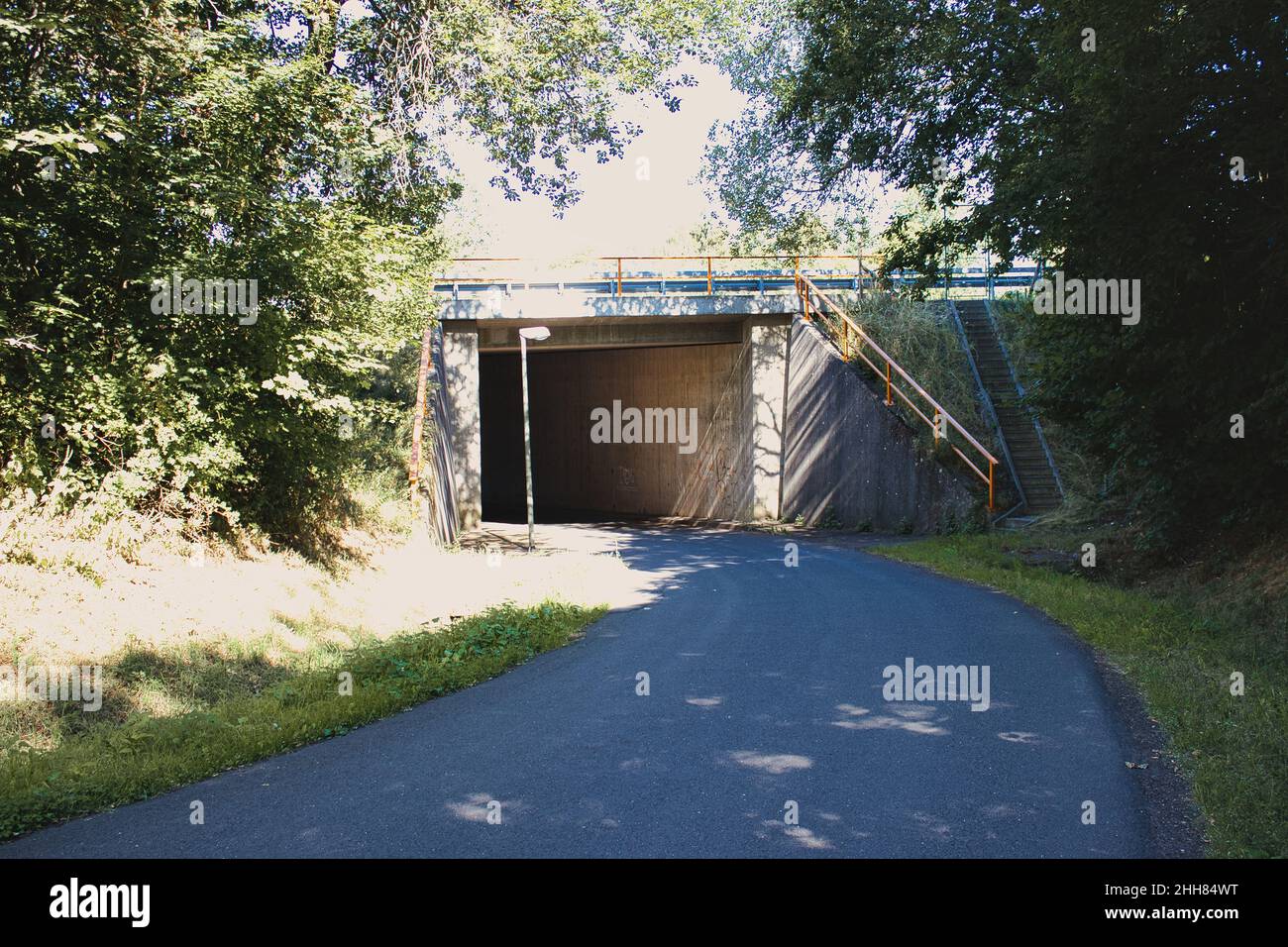 Tunnel entrance under the highway Stock Photo - Alamy