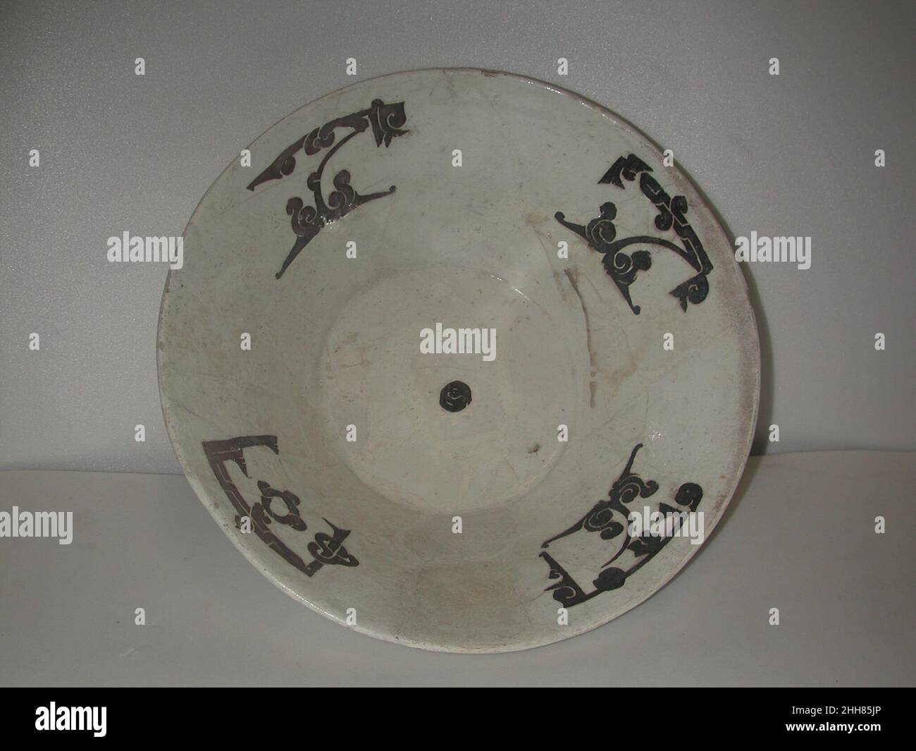 Bowl 10th century The floriated kufic script used to decorate this bowl ...