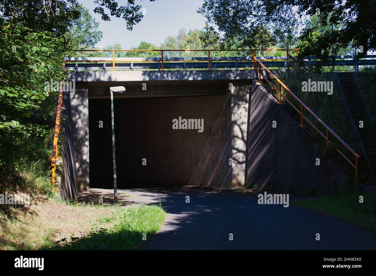 Tunnel entrance under the highway Stock Photo - Alamy