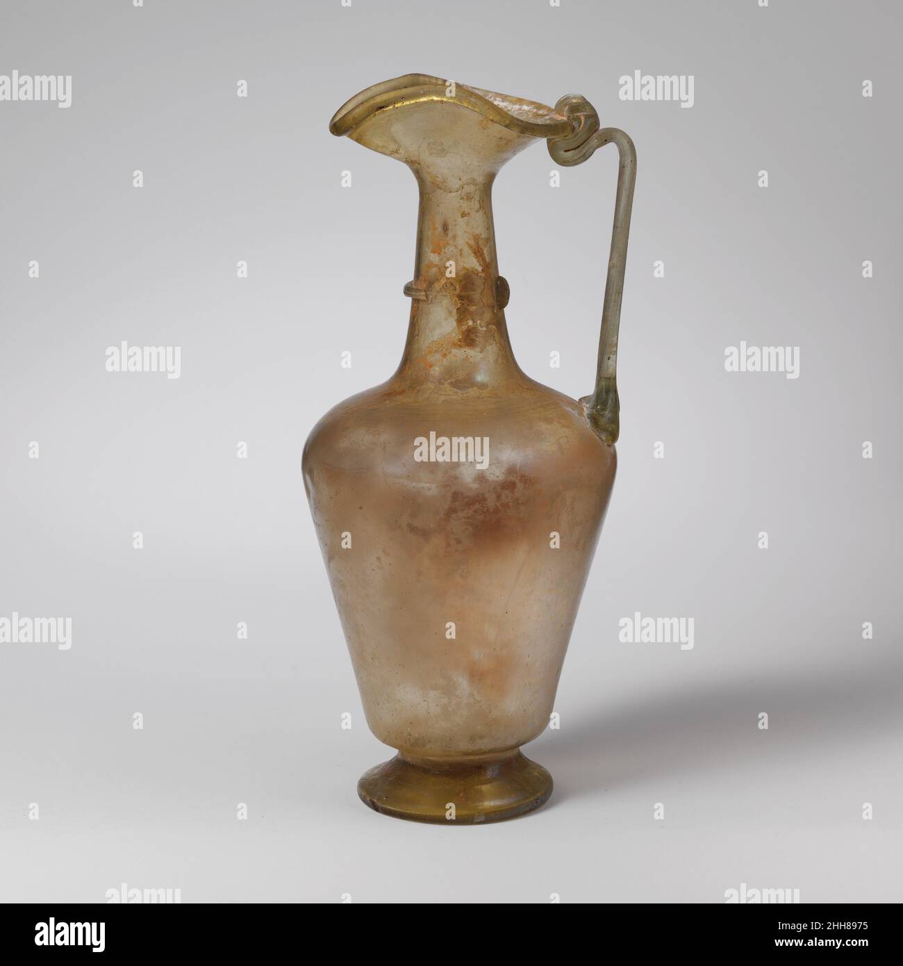 Glass jug with trefoil rim 4th–5th century A.D. Roman Translucent pale ...