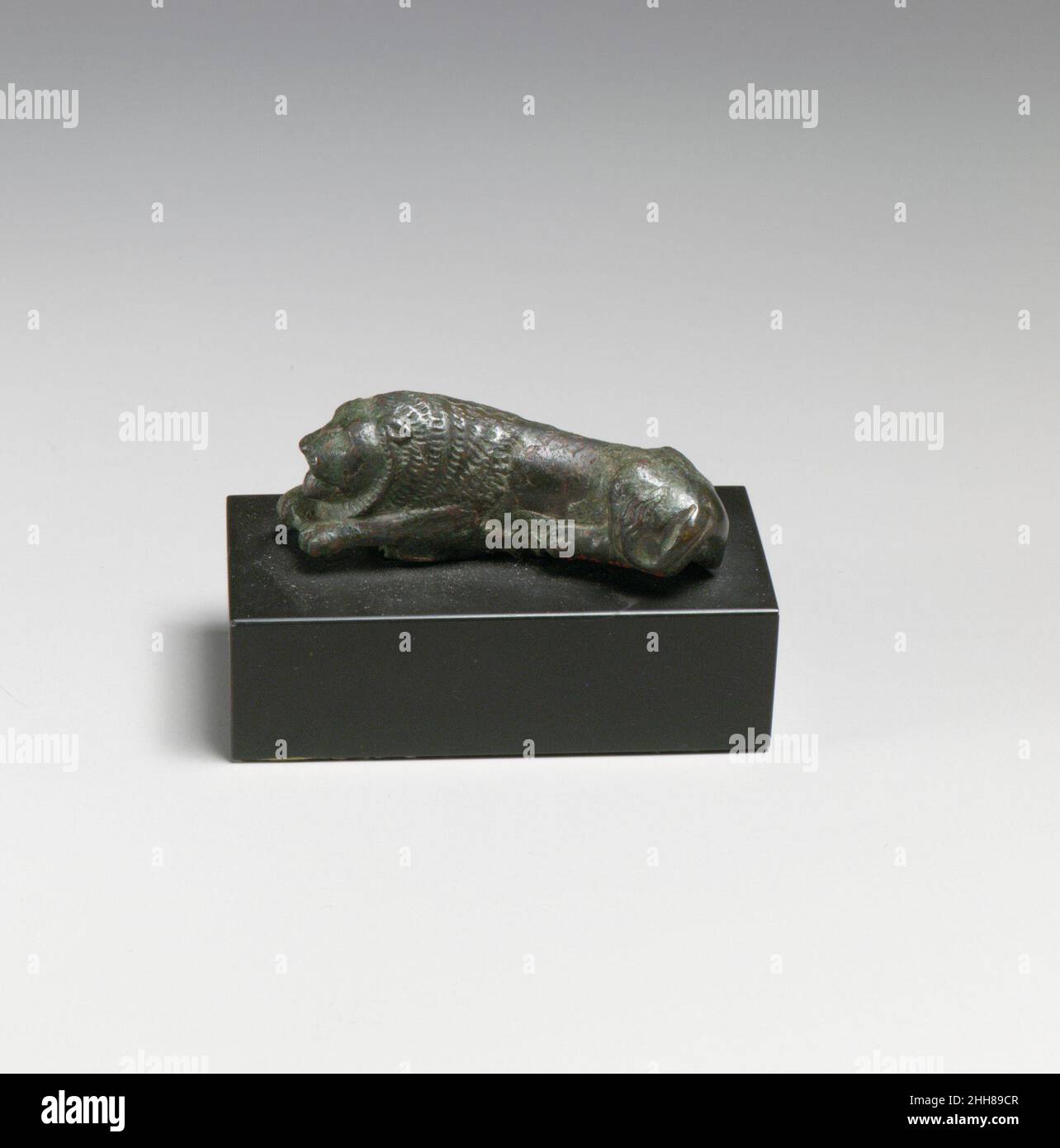 Bronze statuette of a recumbent lion late 5th century B.C. Greek The ...