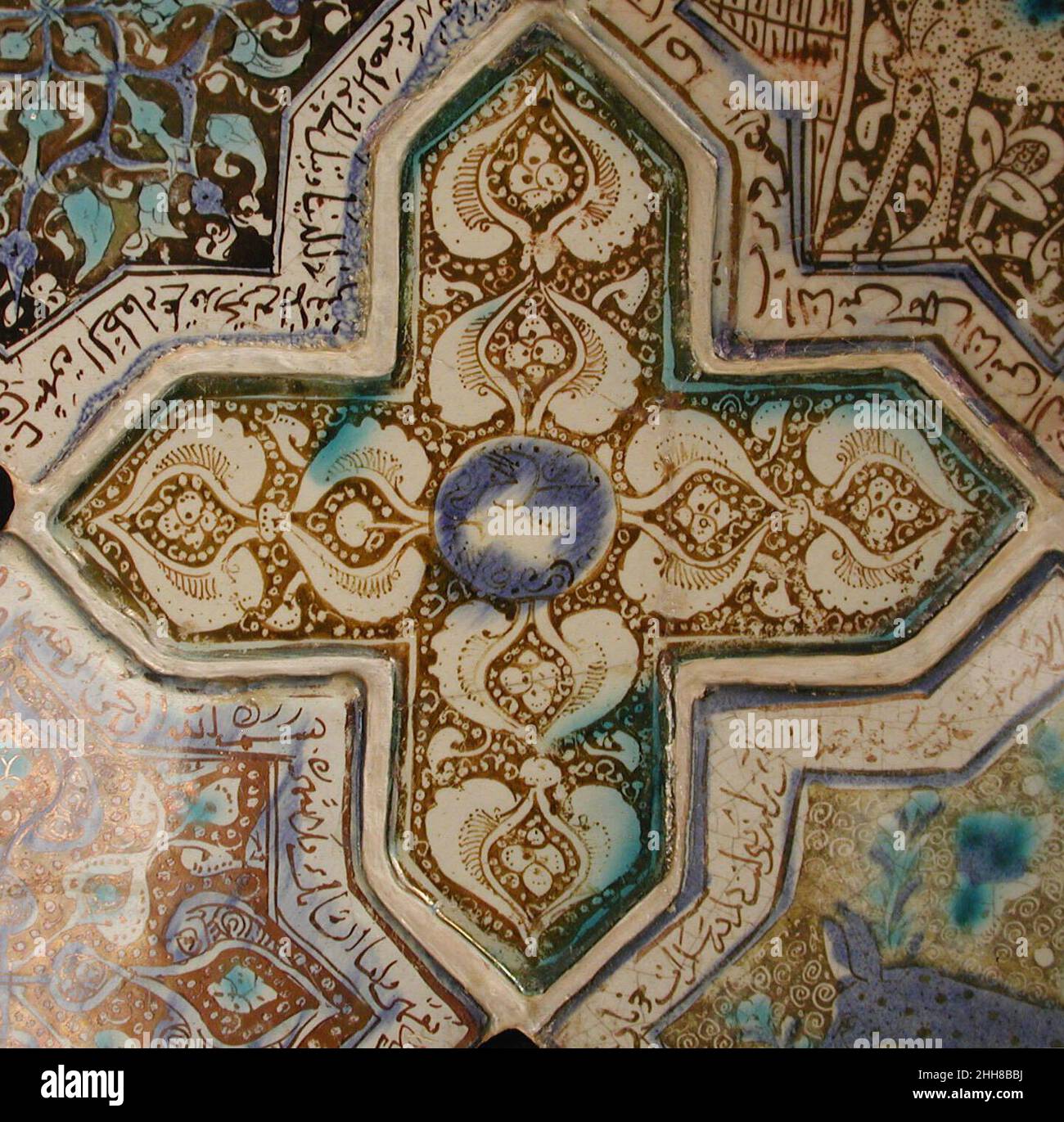 Cross-Shaped Tile 13th century This cross-shaped tile with a ...