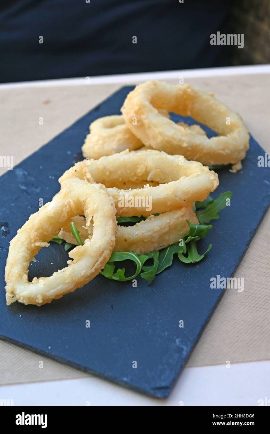 Fried calamari rings Stock Photo - Alamy