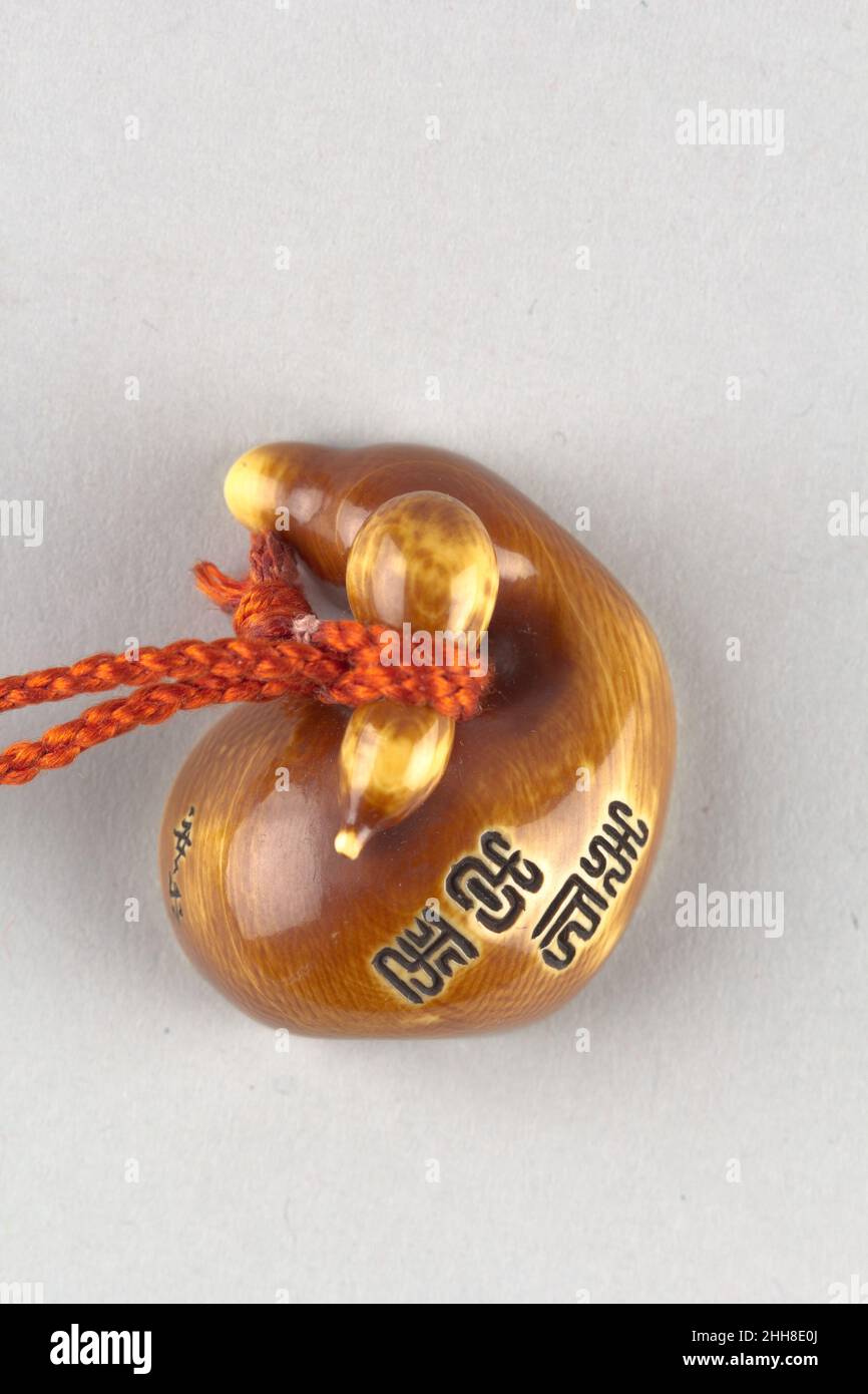 Netsuke of a Small Gourd on a Halved-Gourd late 19th century Anraku ...