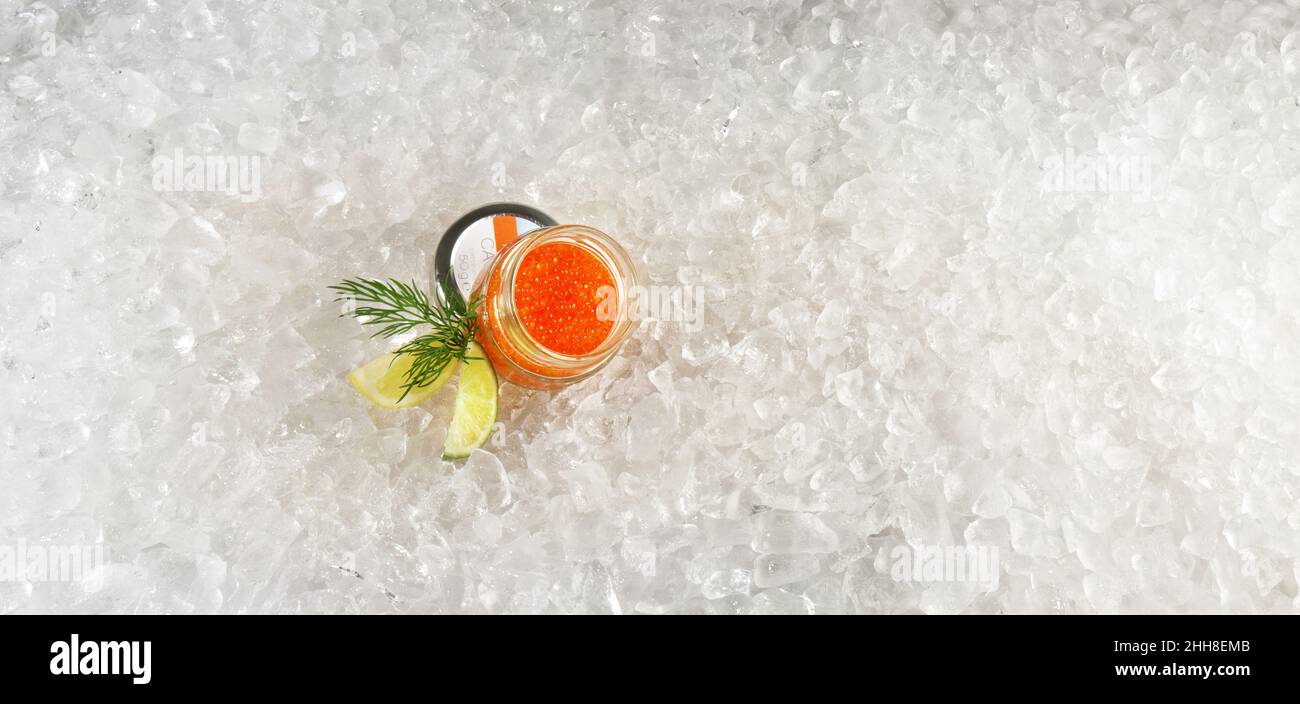 Red Salmon or Trout Caviar on Ice - Banner Stock Photo - Alamy