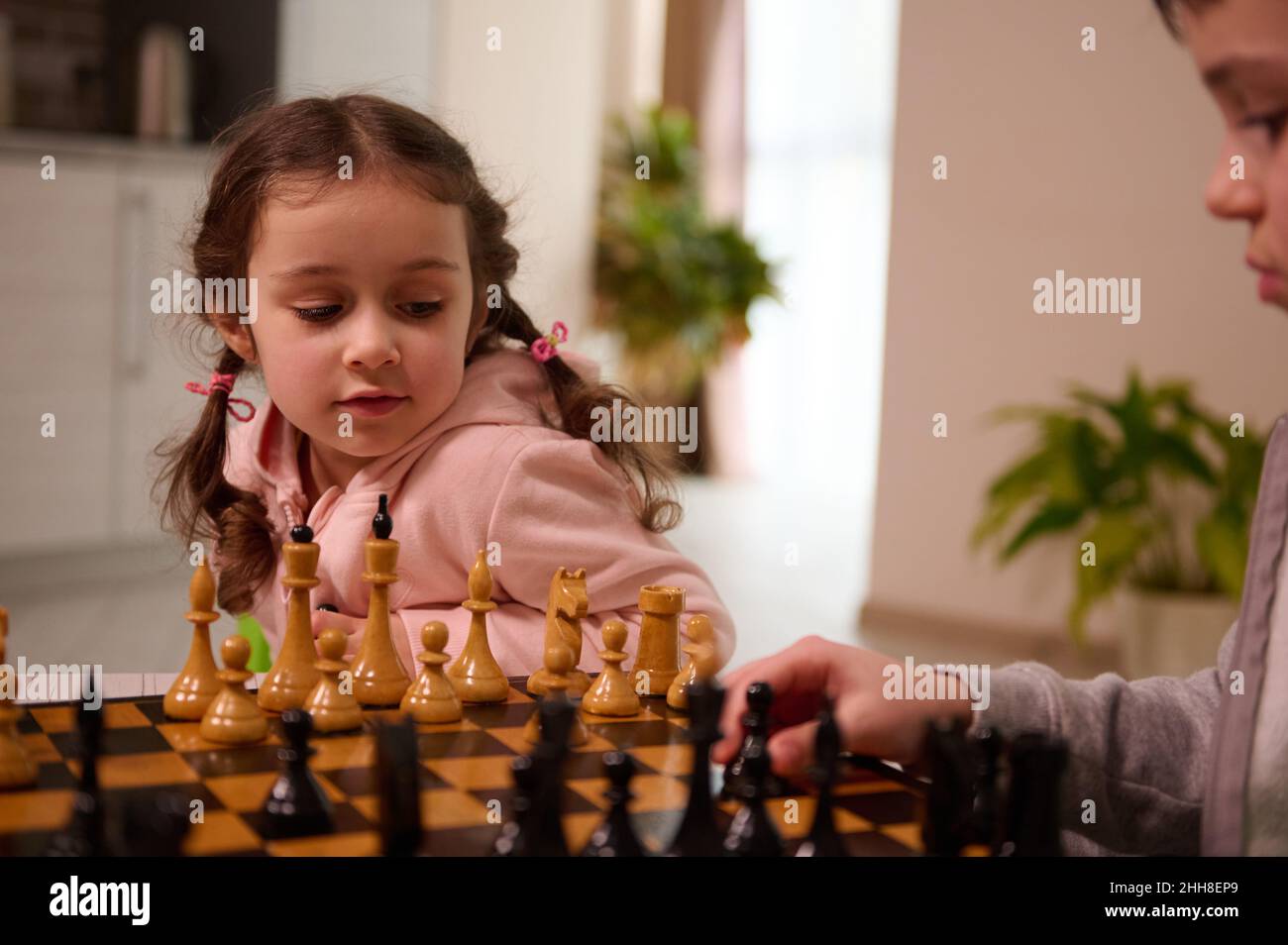 Girl winning chess tournament hi-res stock photography and images - Alamy