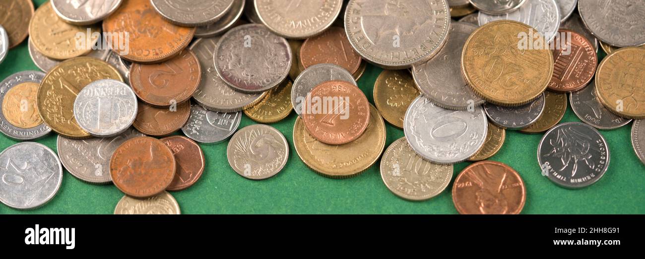 Banner. Collection of old coins on green background with copy space ...