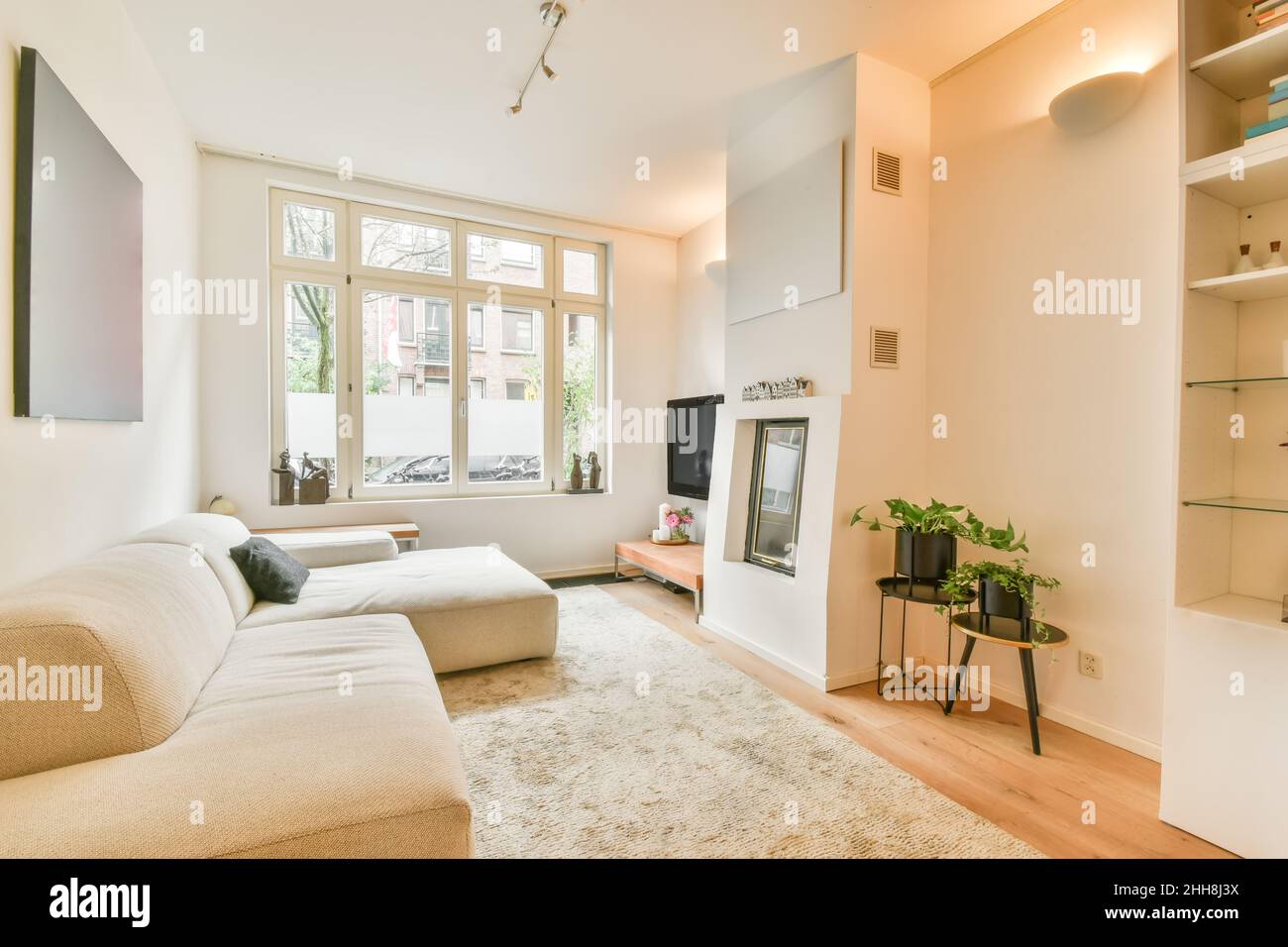 Interior design of small clean living room Stock Photo - Alamy