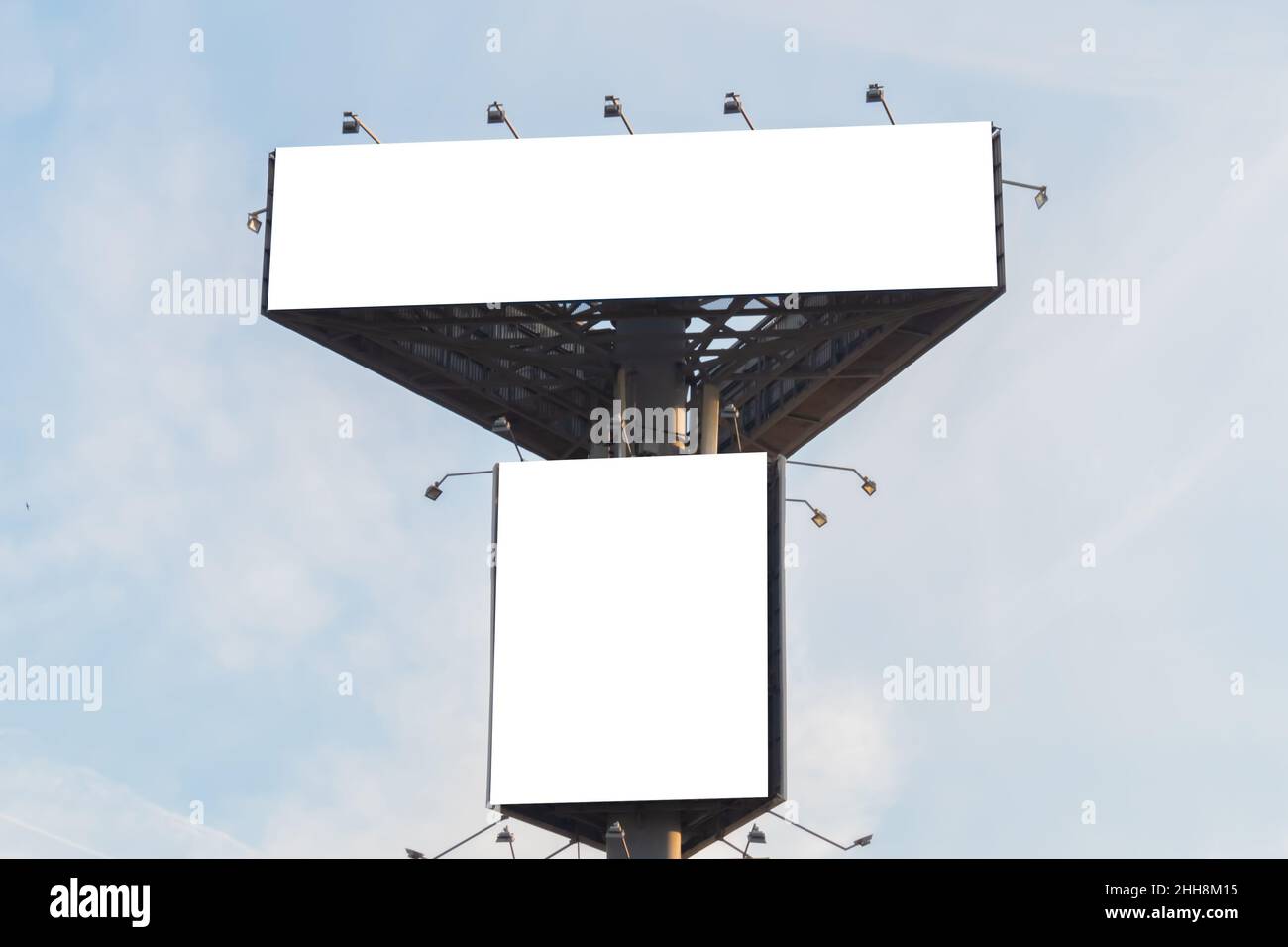 Two blank white billboards against blue sky Stock Photo - Alamy