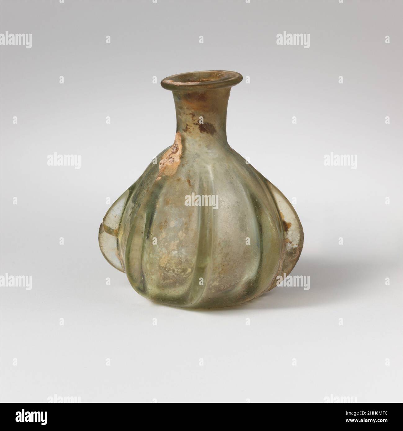 Glass ribbed bottle 1st century A.D. Roman Translucent light green ...