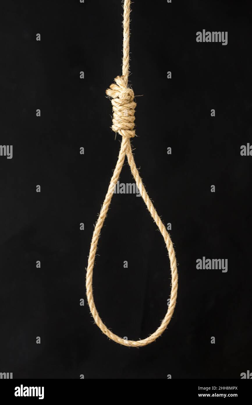 knotted gallows rope on black background Stock Photo - Alamy