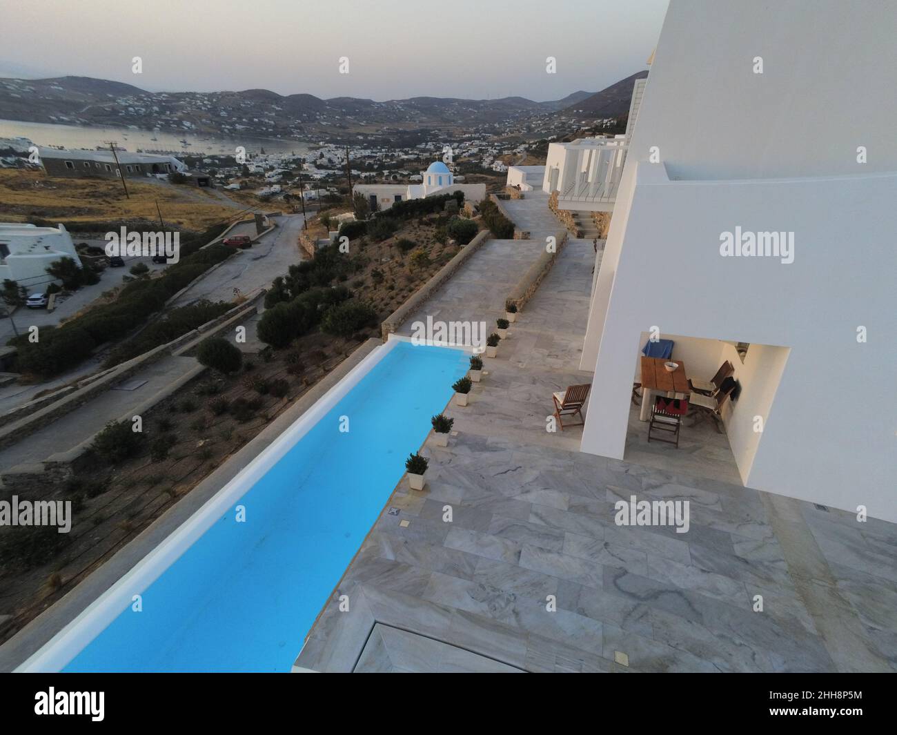 Aerial view of a luxurious greek house with swimming-pool. Typical ...