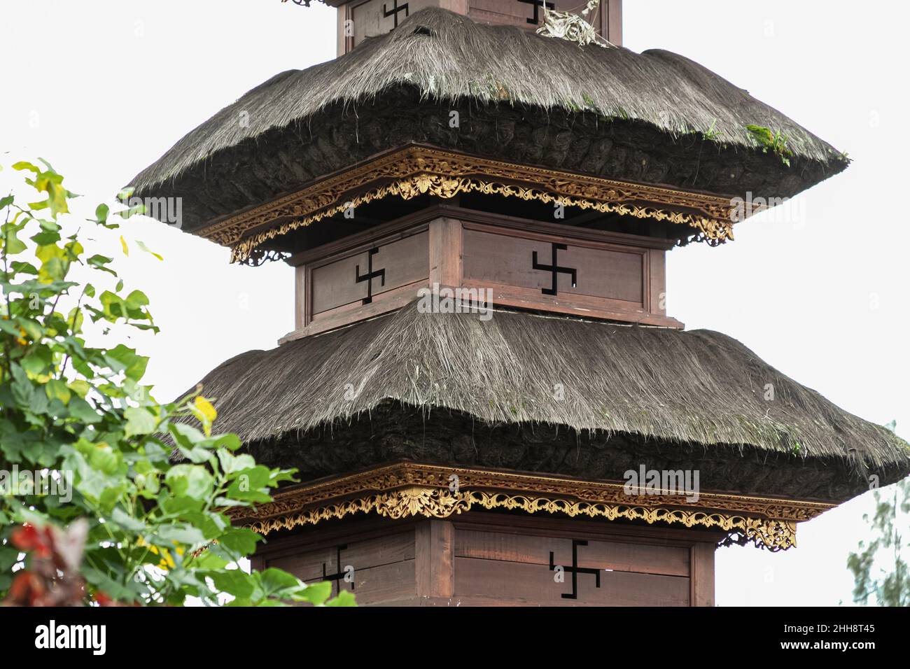 Swastika carved into temple in Bali, Indonesia Stock Photo - Alamy