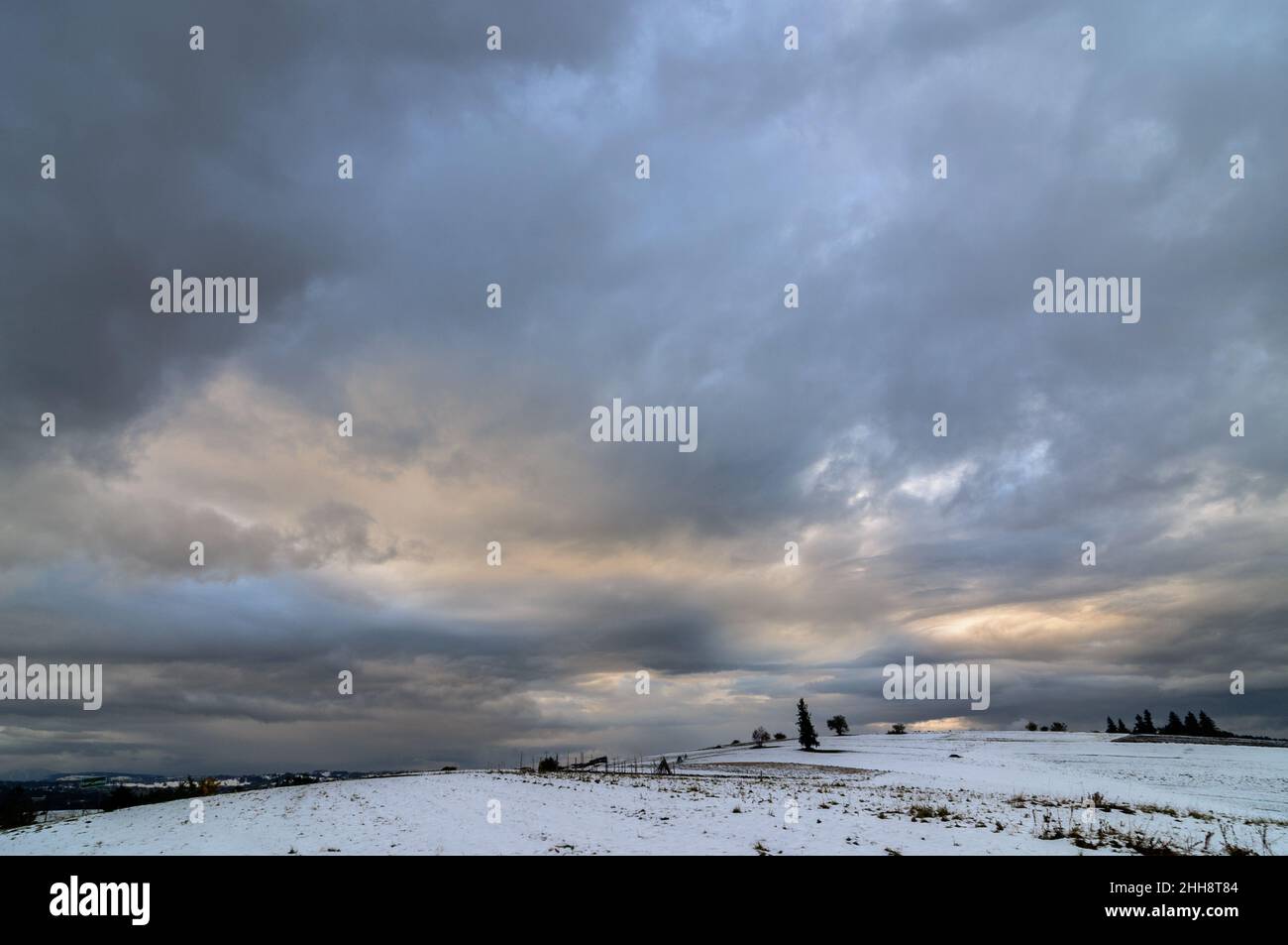 Sunset visible in Podhale (Poland). Cloudy sky with glimpses of the sun ...