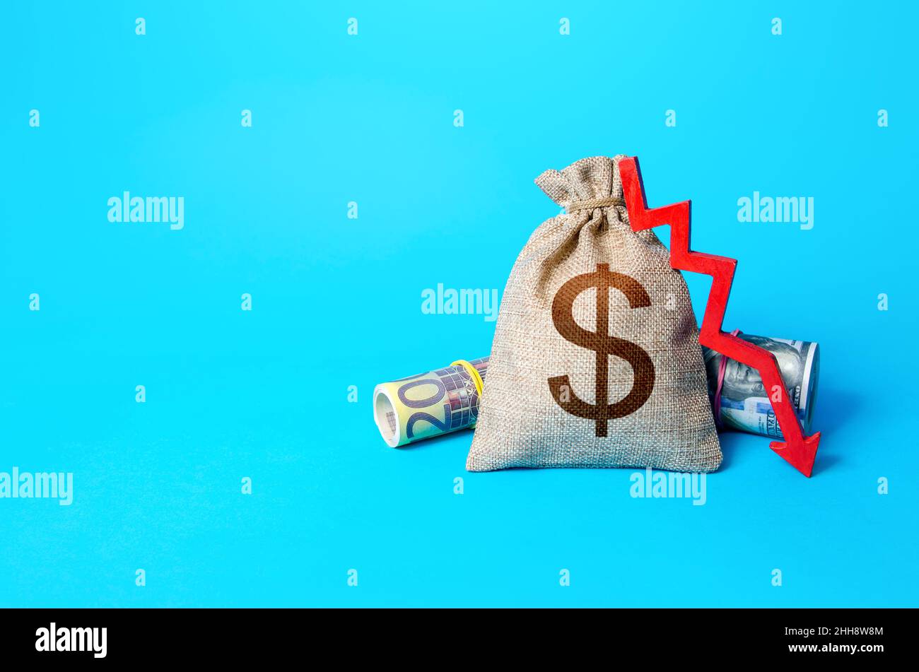Dollar money bag and arrow down. Falling economy. Drop in profits. Decrease in interest rate ...