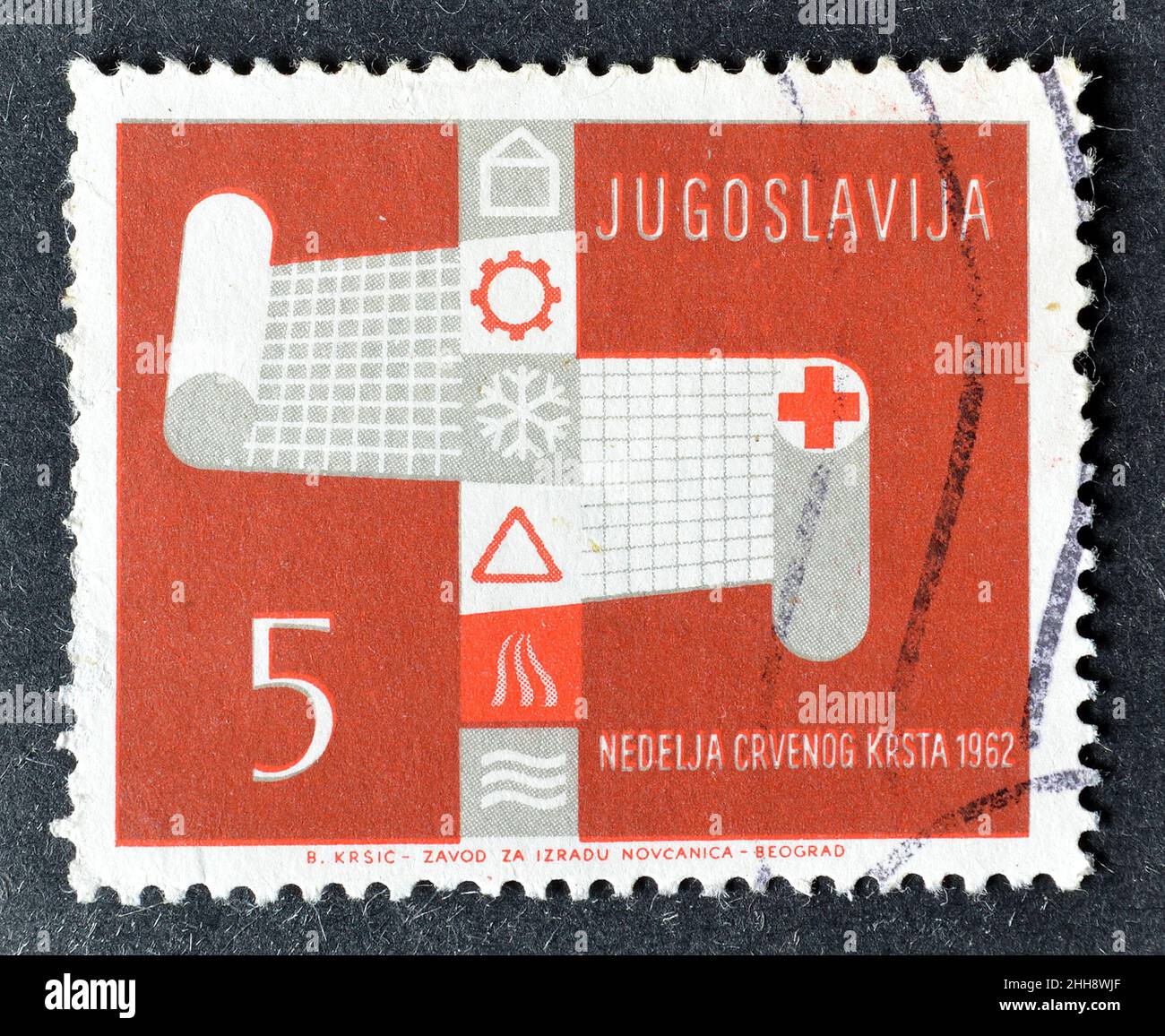 Cancelled postage stamp printed by Yugoslavia, that shows Charity stamp ...