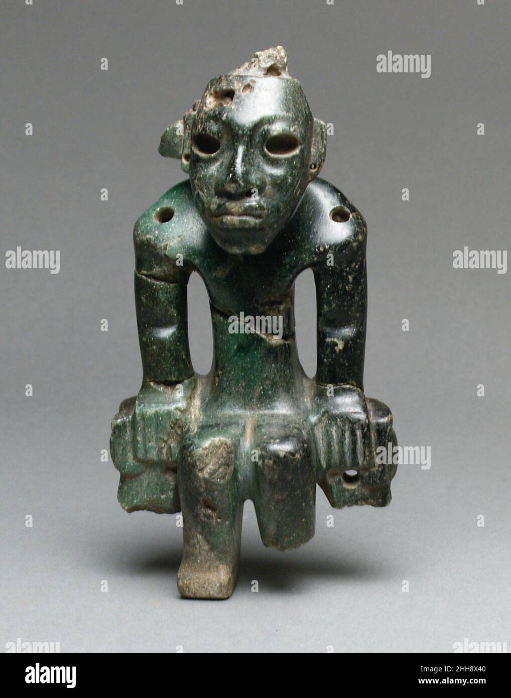Bench Figure 5th–2nd century B.C. Epi-Olmec A stylized figure sits on a ...