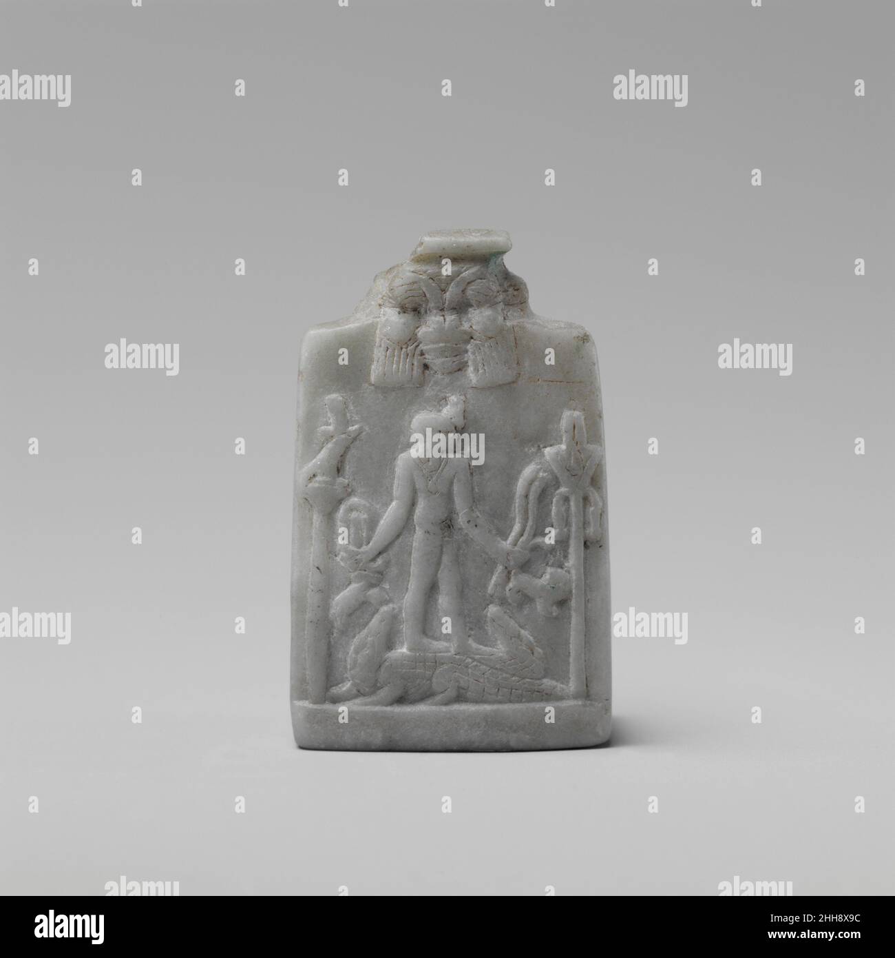 Miniature Cippus (magical stela) with Horus in profile wearing gazelle ...