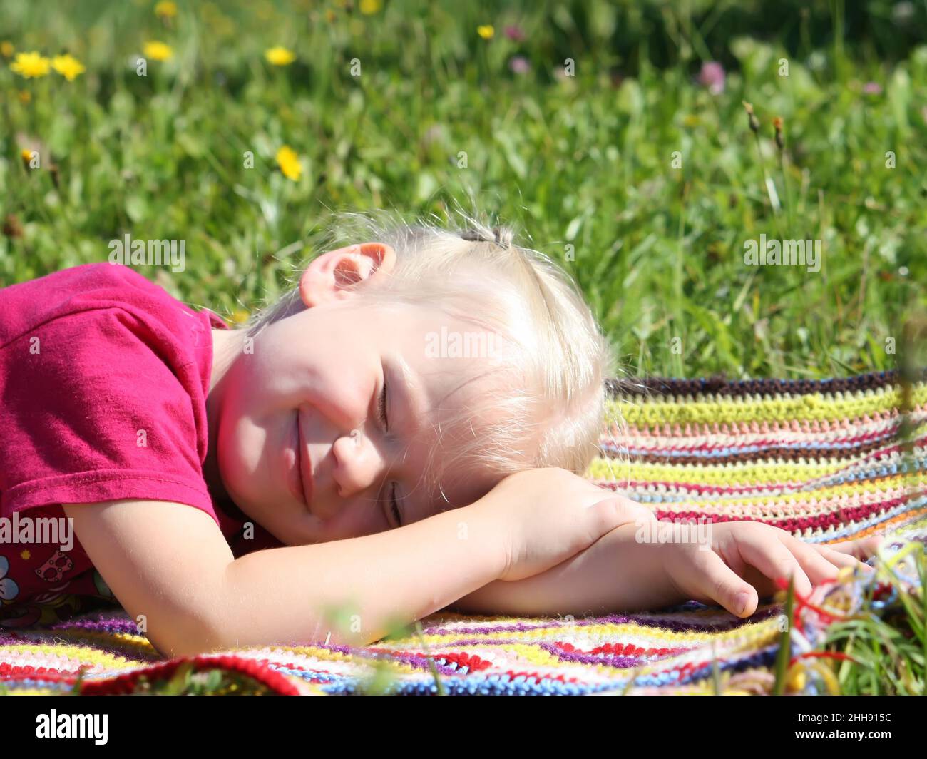 School children sleeping in grass hi-res stock photography and images ...
