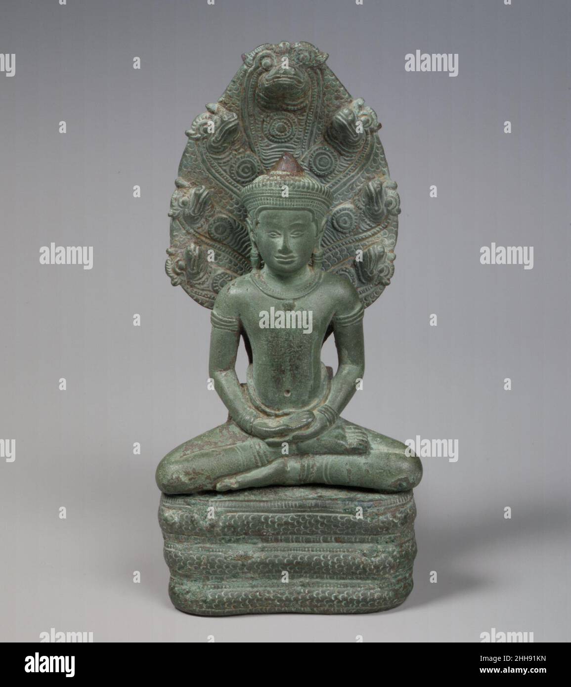 Buddha Sheltered by a Naga 12th century Cambodia This sculpture depicts ...