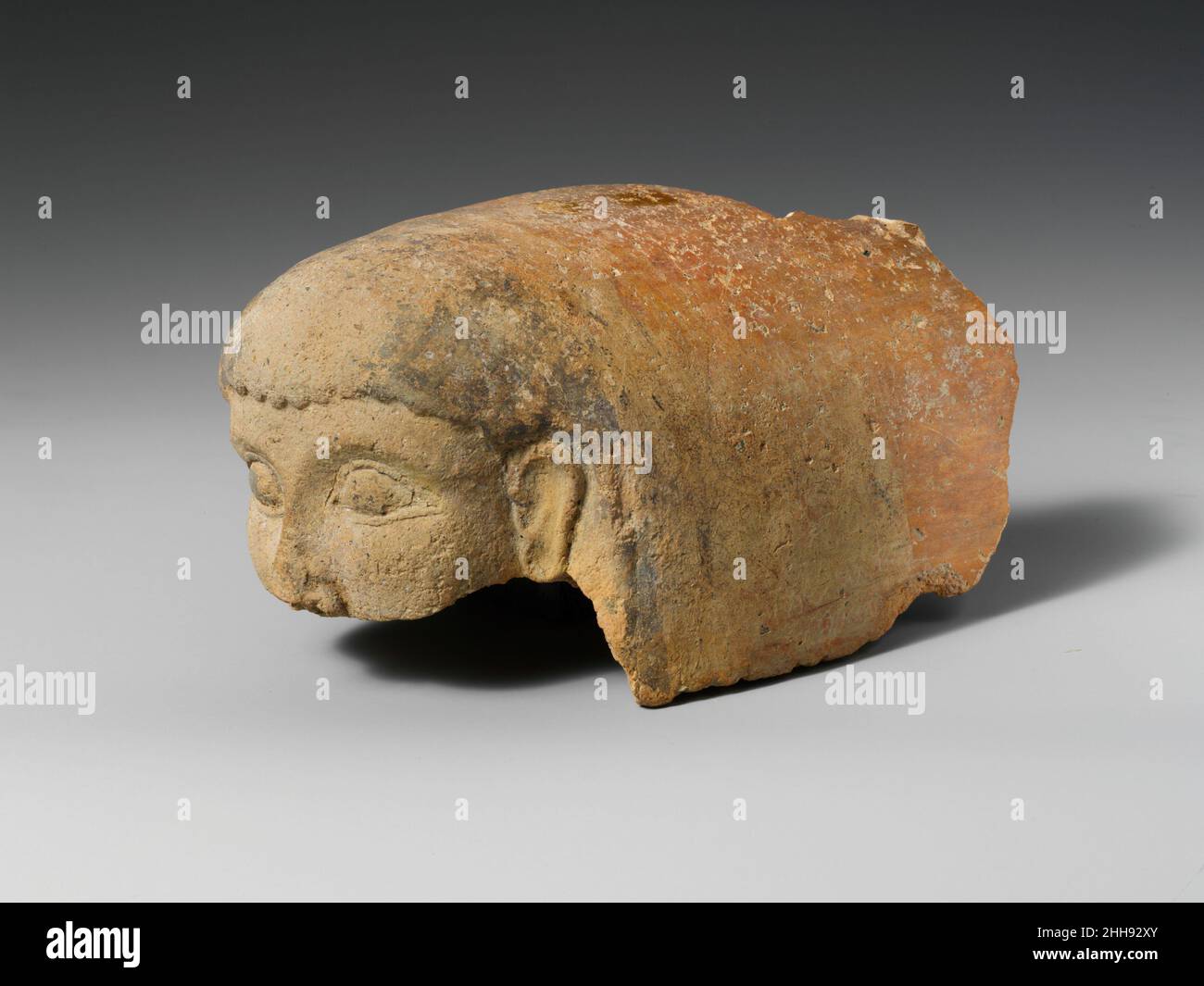 Terracotta antefix (roof tile) with female head late 6th century B.C ...