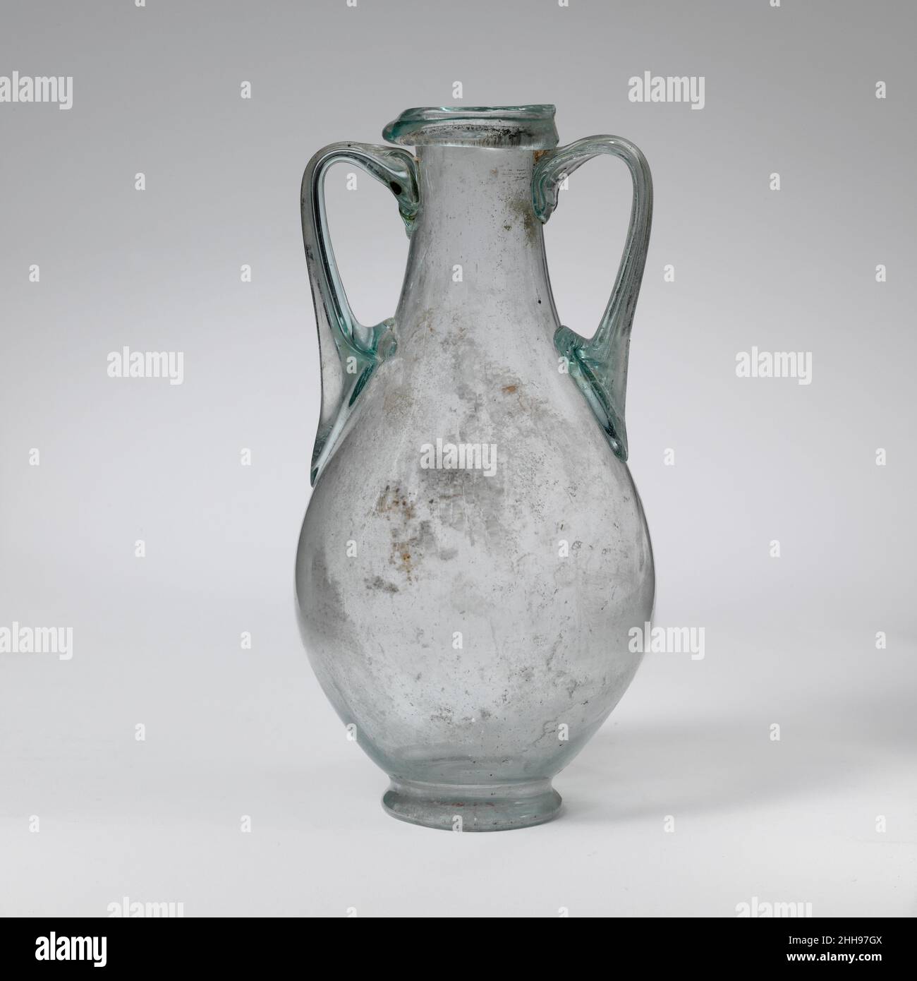 Glass amphora 1st century A.D. Roman Translucent pale blue green ...