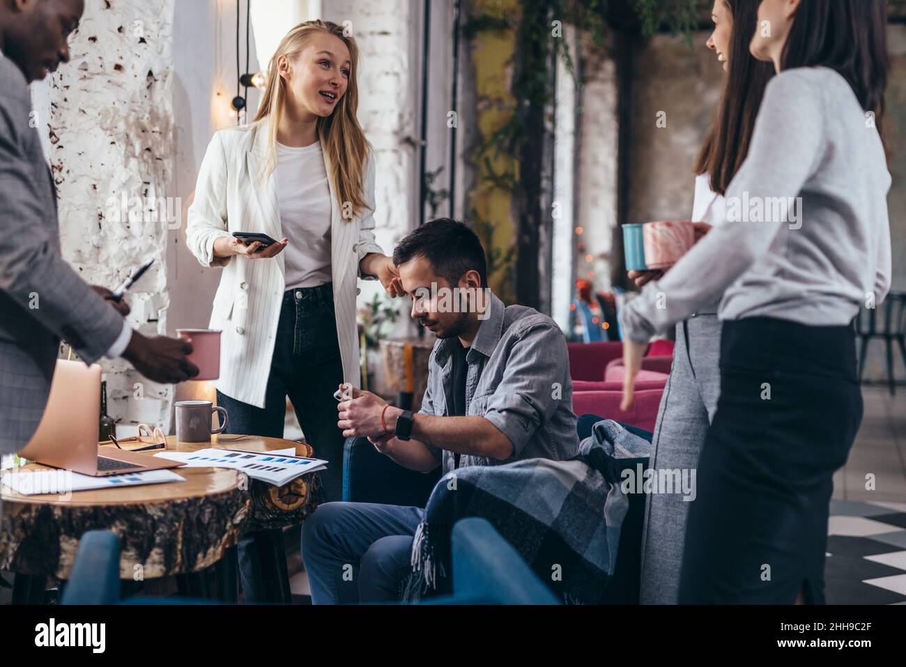 Group of students sitting together and studying Stock Photo - Alamy
