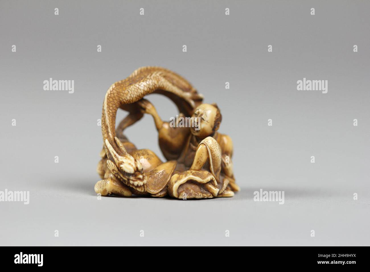 Netsuke of Two Figures and a Dragon 19th century Japan. Netsuke of Two ...