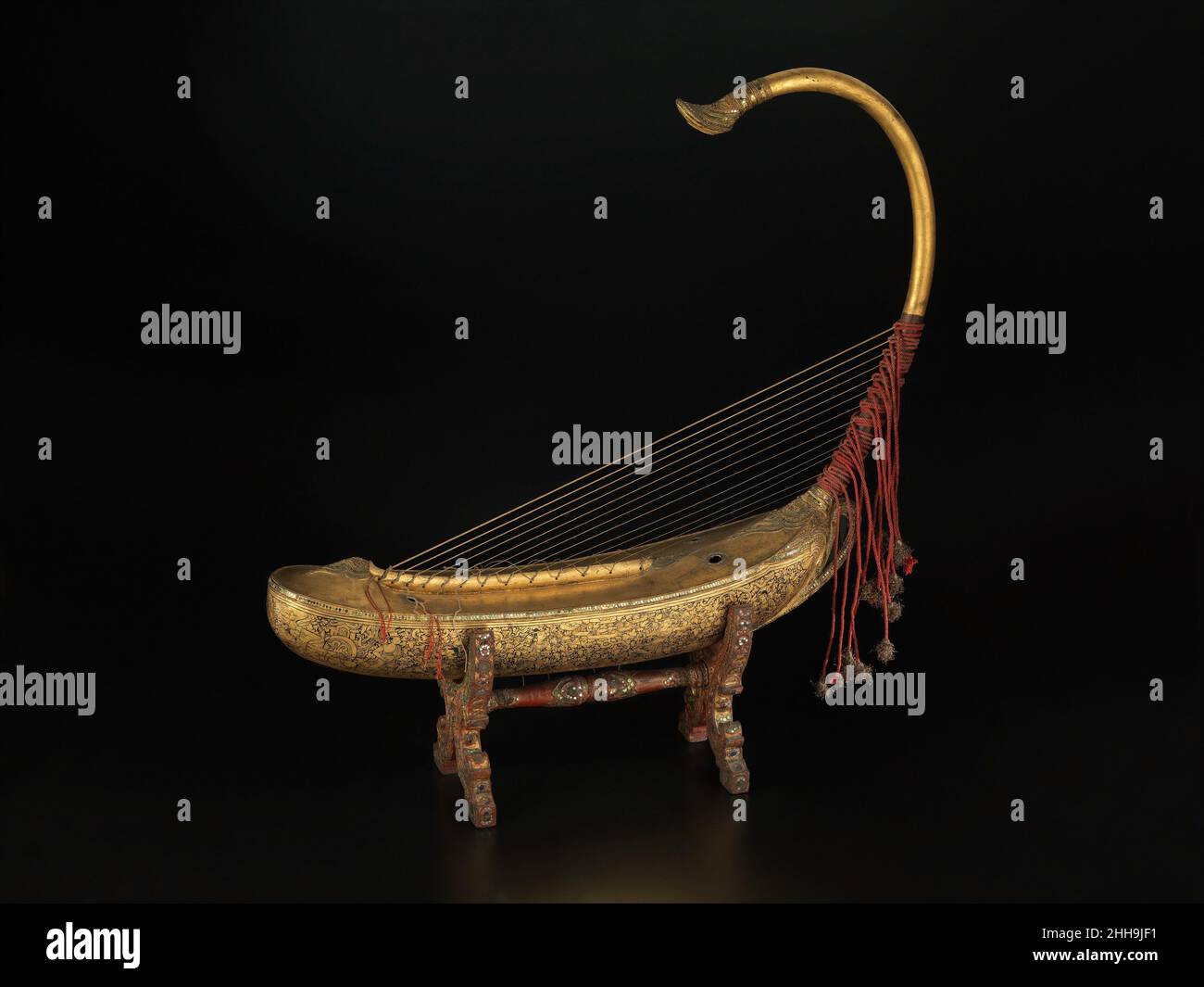 Saùng-Gauk 19th century Burmese This richly decorated arched harp has ...