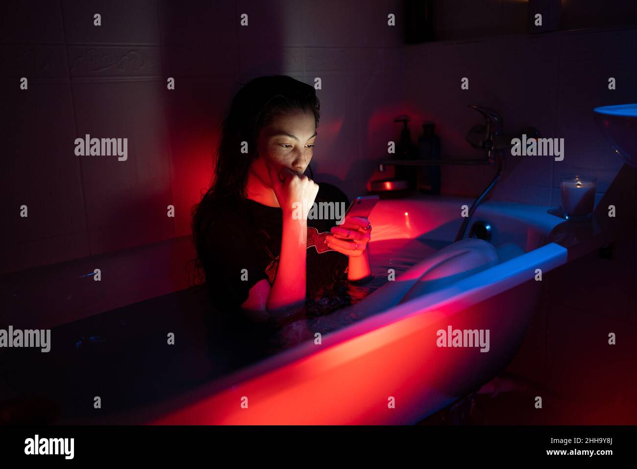 Woman alone sit bathroom hi-res stock photography and images - Alamy