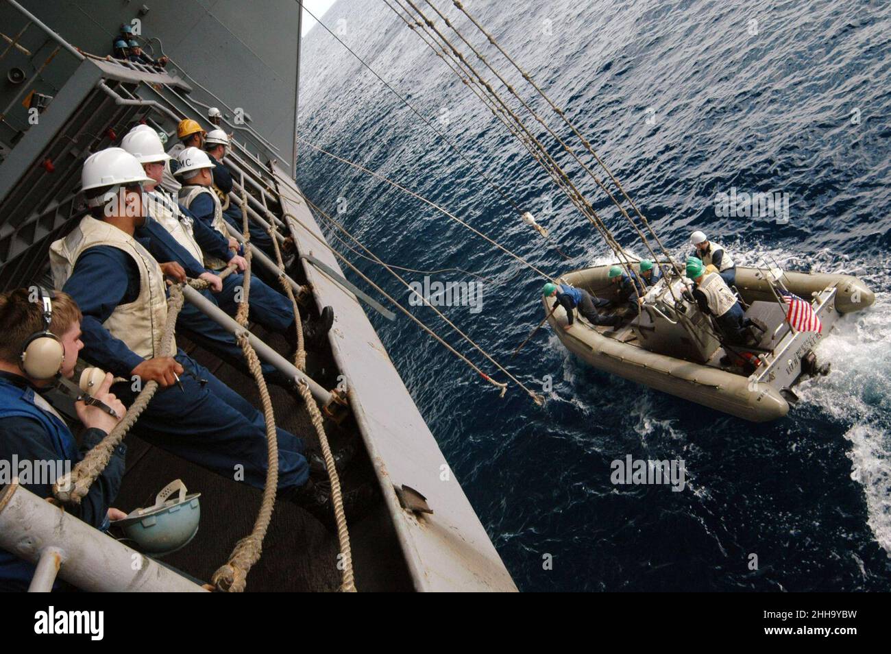 Small boat operations aboard USS Kitty Hawk Stock Photo - Alamy