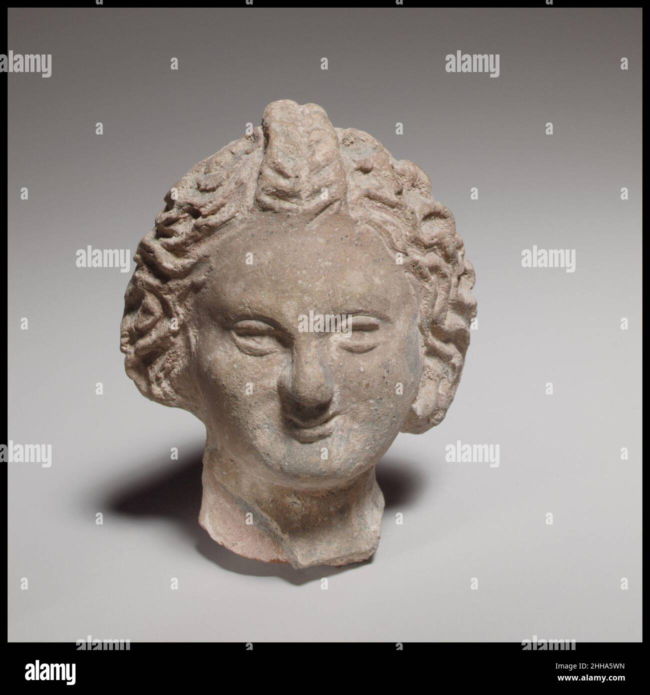 Head of a child 2nd century B.C. Cypriot The head is mold-made and ...