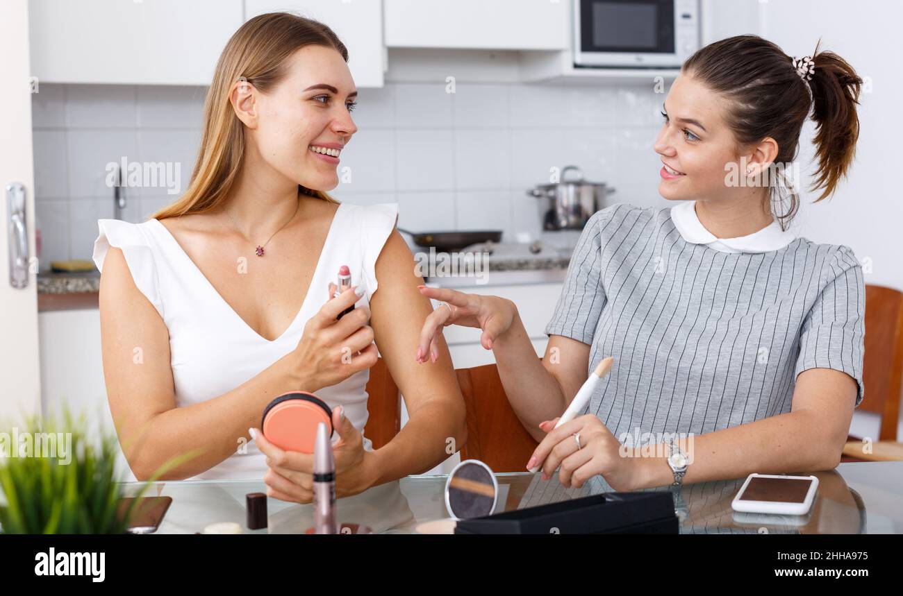 Two girls applying make up Stock Photo - Alamy