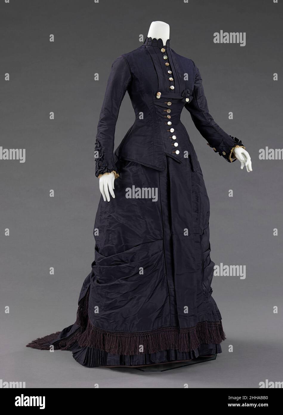 Dress 1877 Mrs. F. M. Carroll American The bustle silhouette, although ...