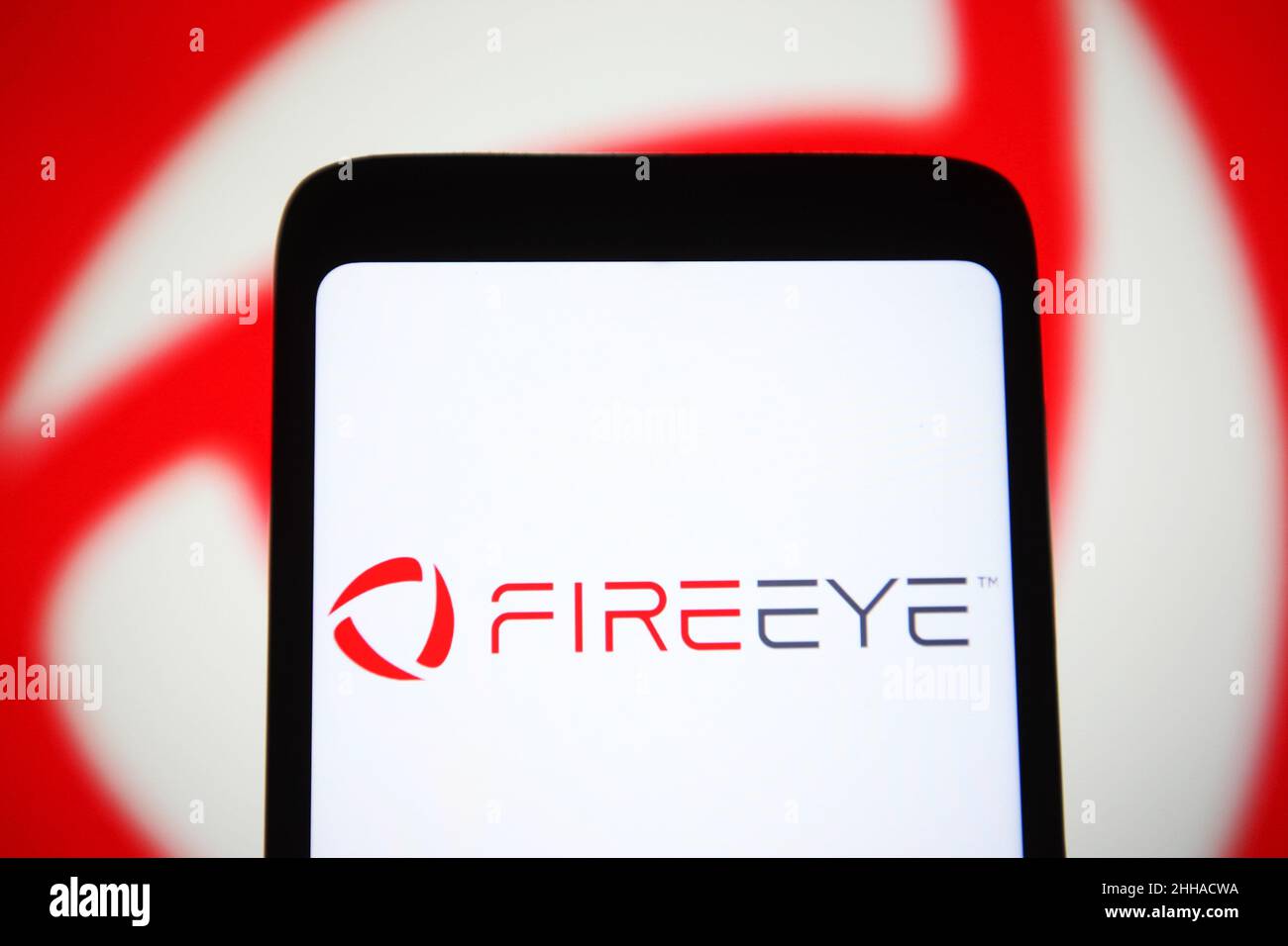 In this photo illustration, a FireEye Inc. logo is seen on a smartphone screen. (Photo by Pavlo ...