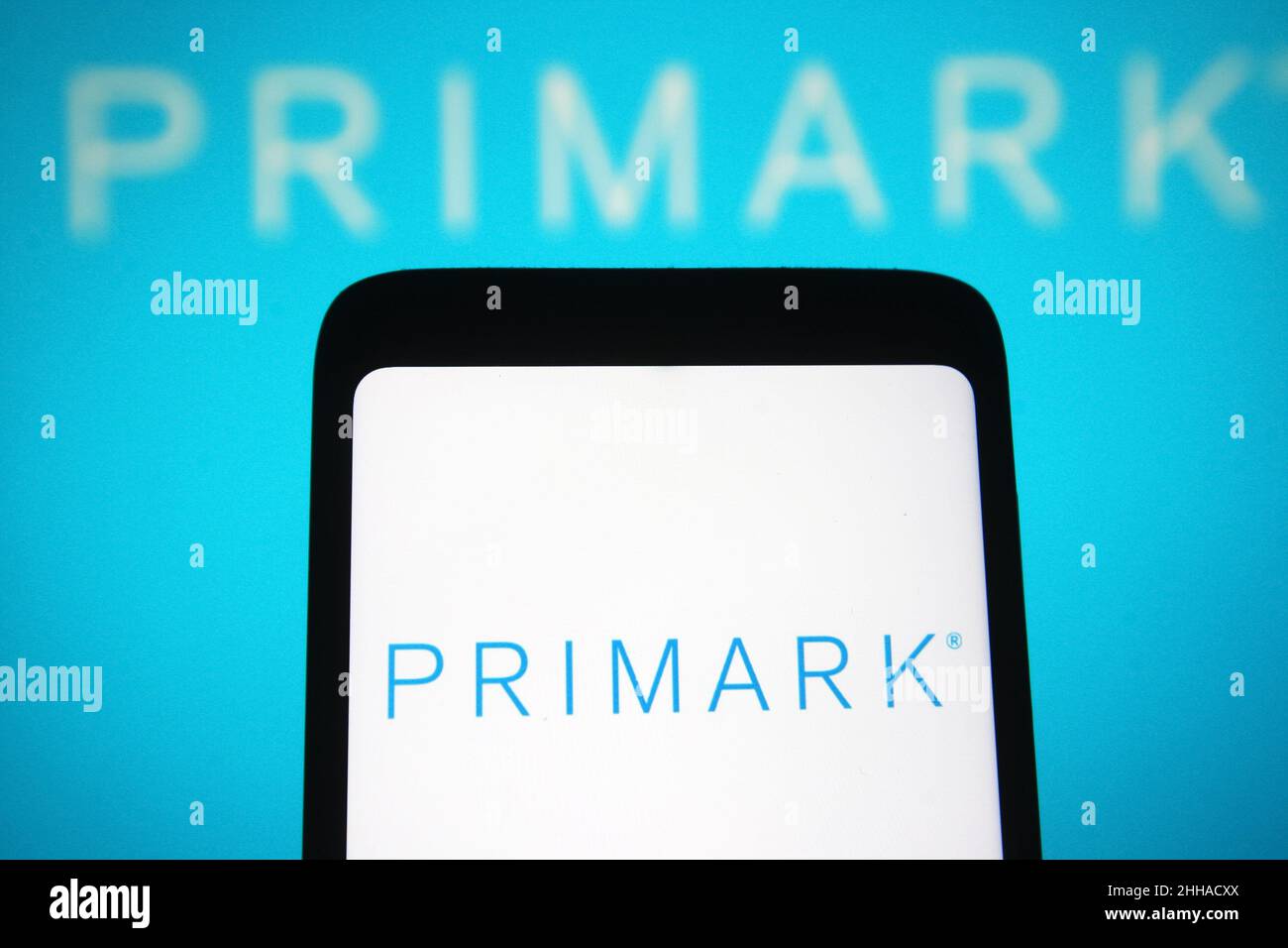 In this photo illustration, a Primark logo is seen on a smartphone and ...