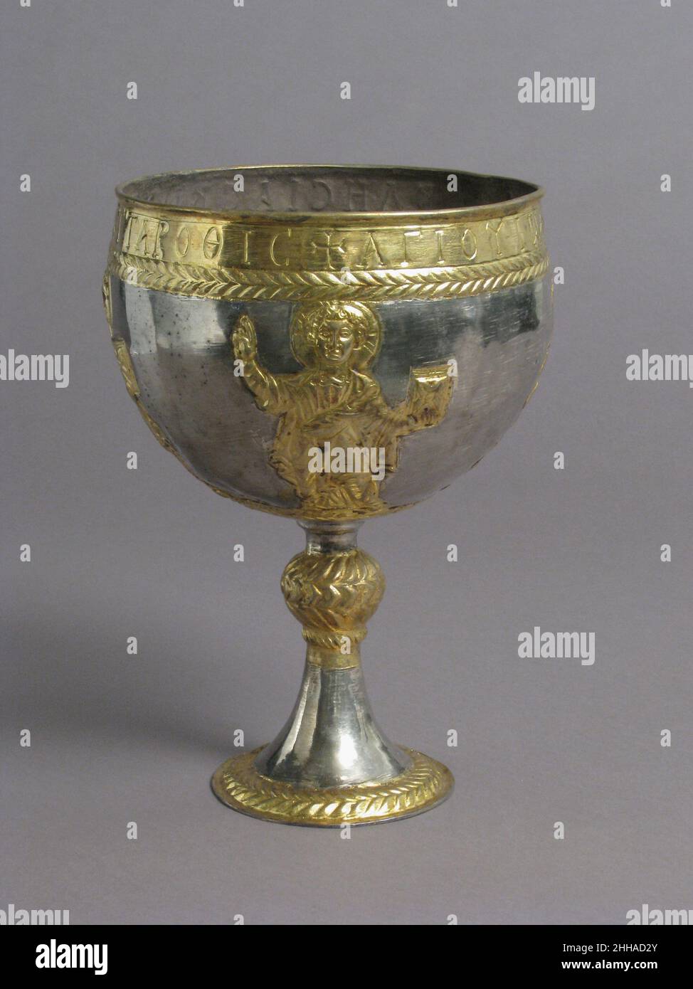Saint john holding chalice hi-res stock photography and images - Alamy