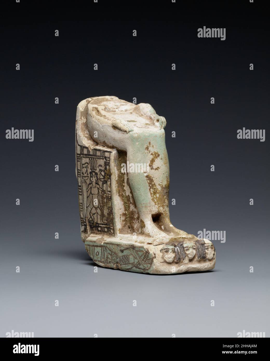 Lower half of a goddess on a throne with Bes figures, its base formed ...