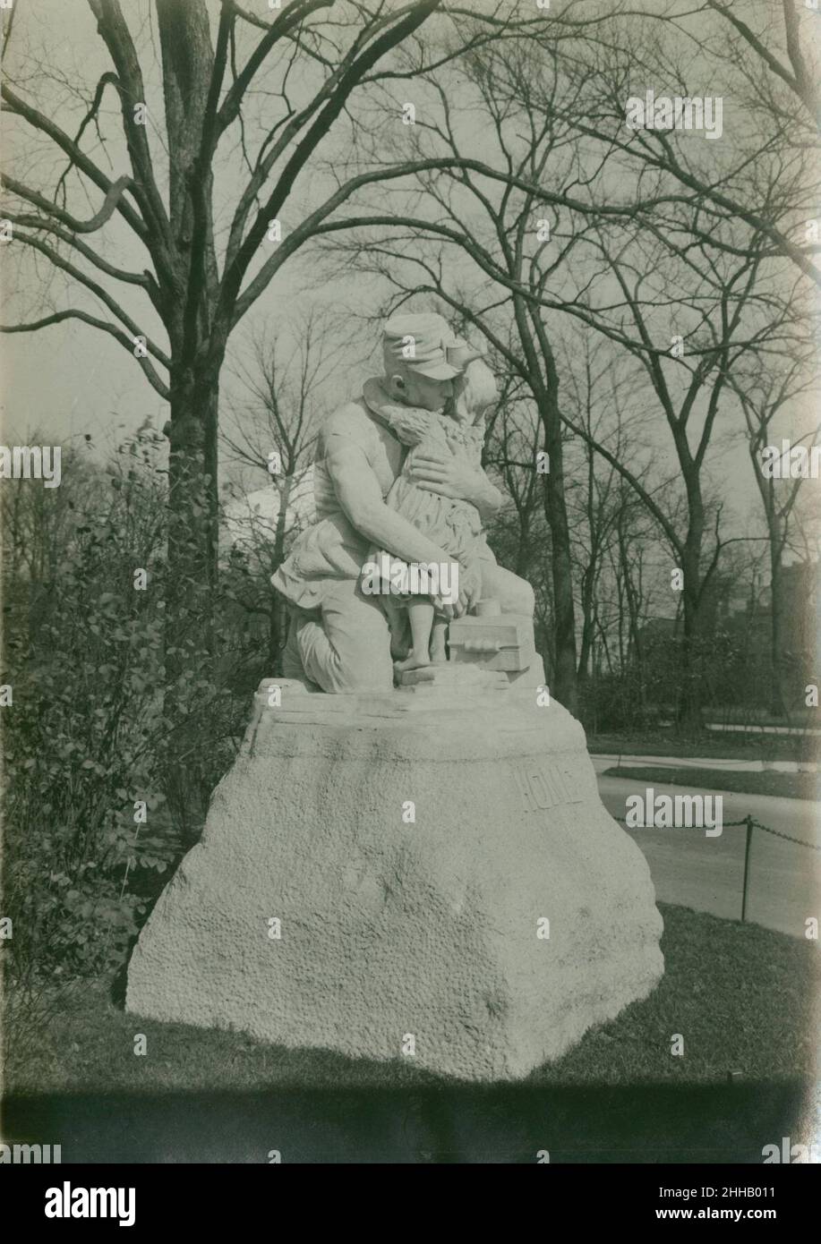 Soldier hugging child statue, Illinois, early 20th century Stock Photo ...