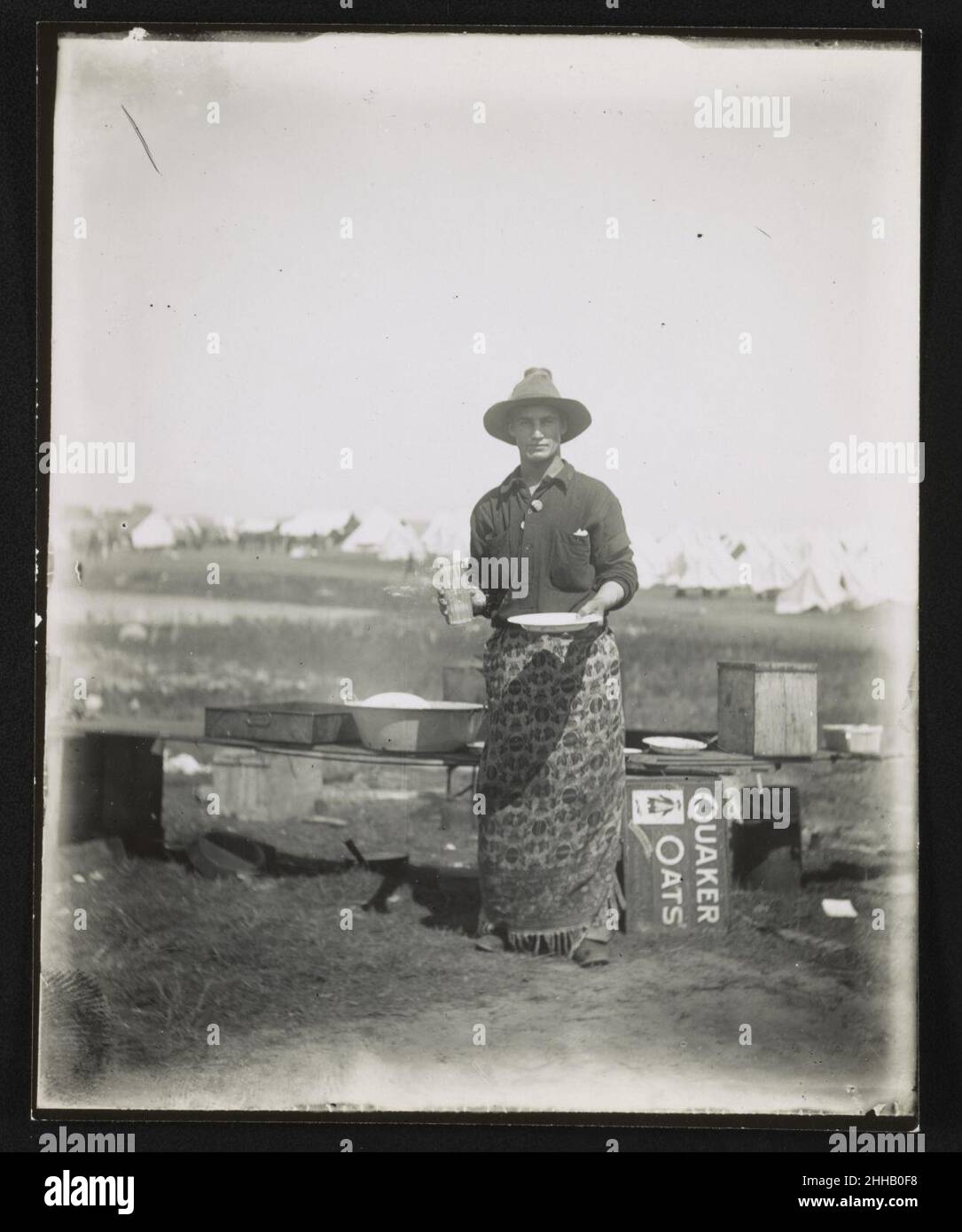 Soldier standing at camp cook area, Rough Riders military camp, Montauk ...