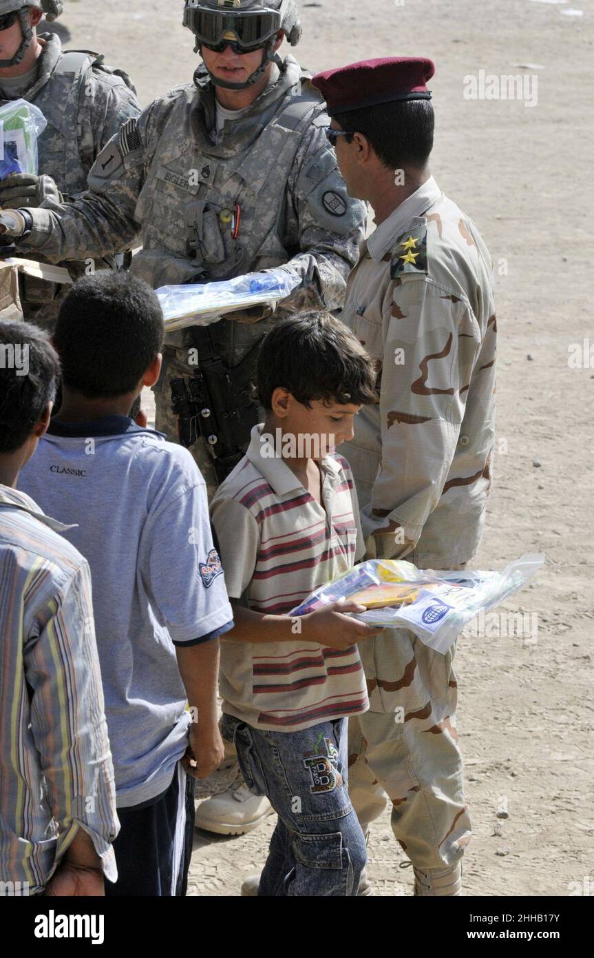 Soldiers deliver school supplies Stock Photo - Alamy