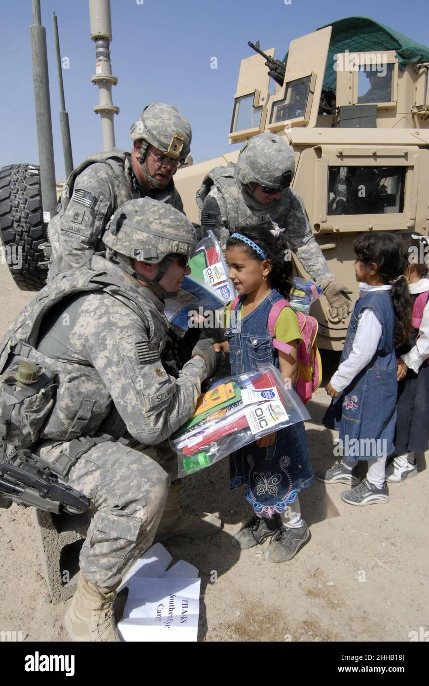 Soldiers deliver school supplies Stock Photo - Alamy