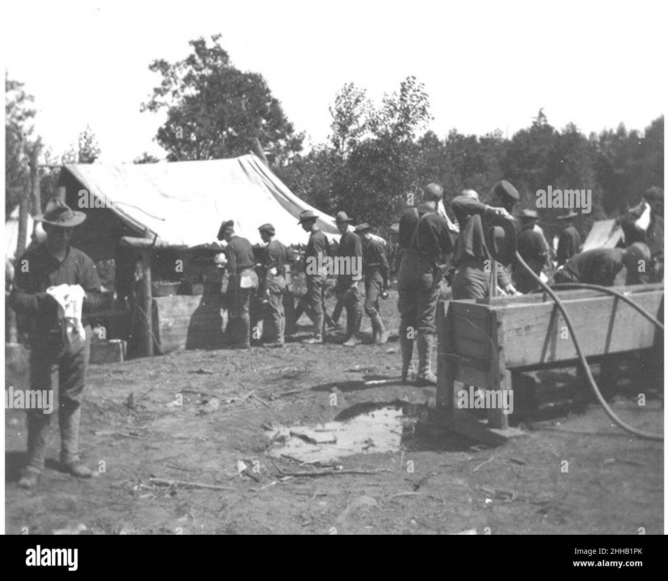 Soldiers lined up in front of mess tent, Fort Lawton, Washington, 1900 ...