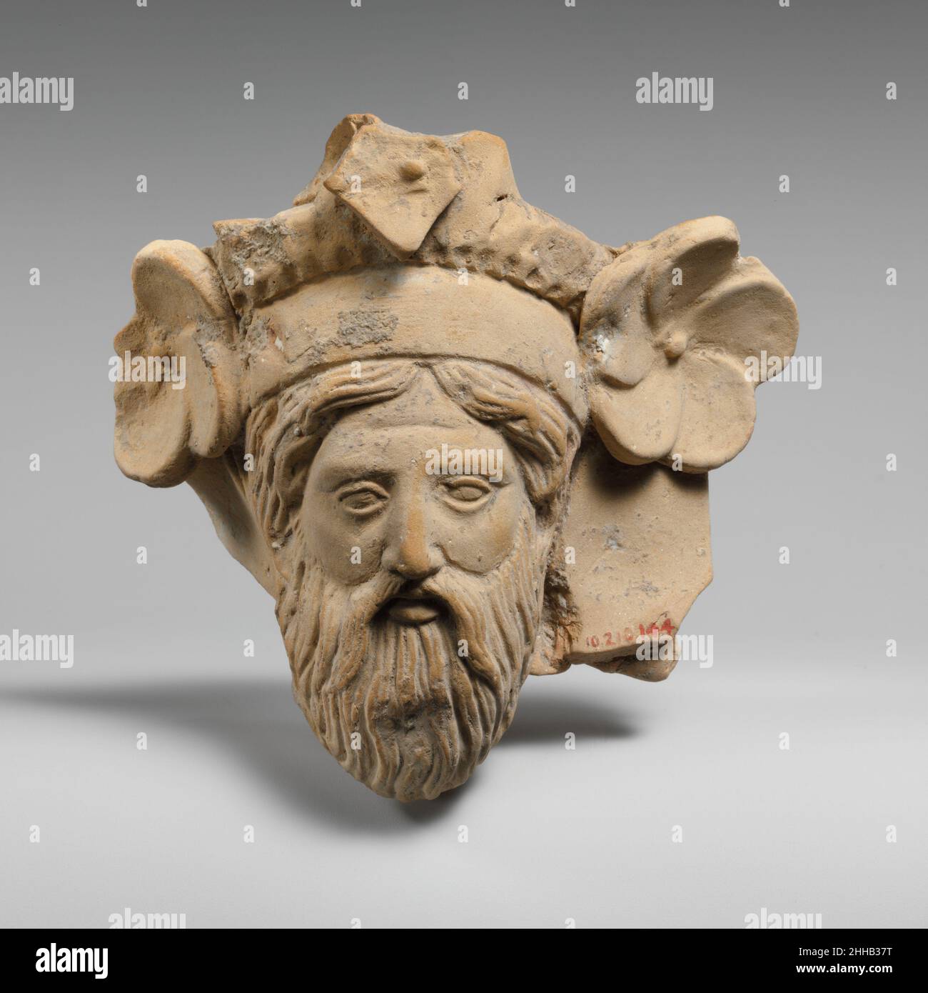 Terracotta head of a man, possibly Dionysos 4th century B.C. Greek ...