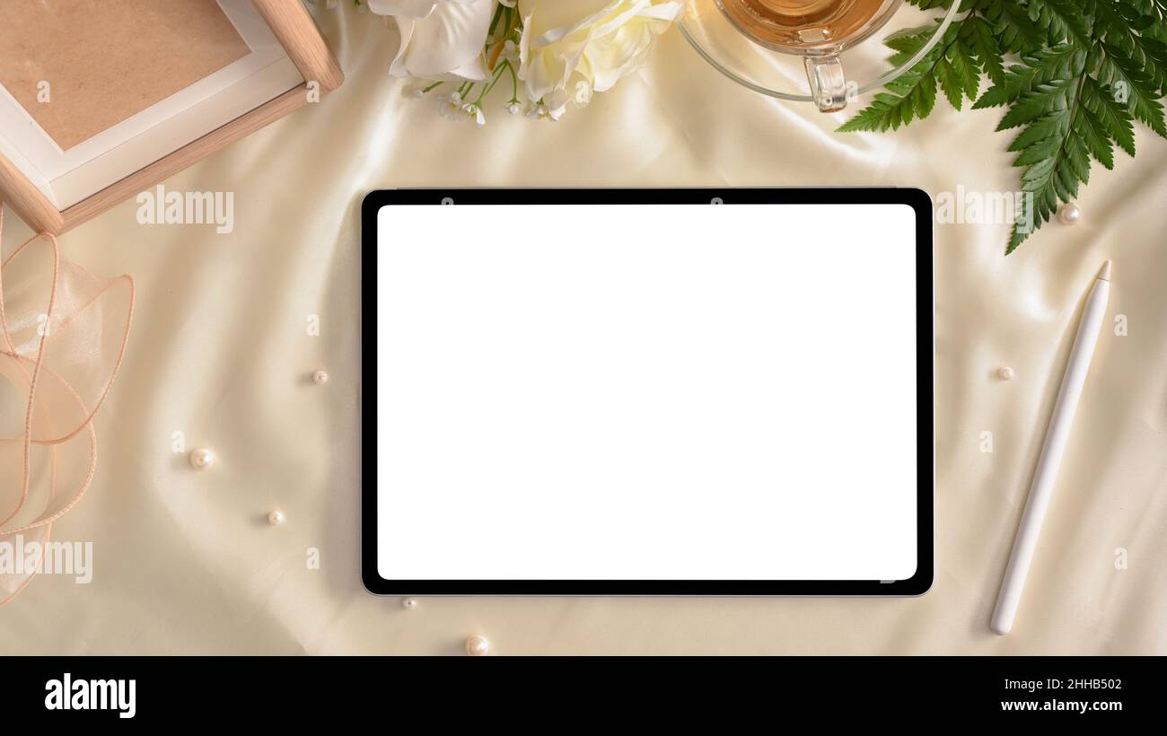 Feminine workspace for online work concept, Digital tablet touchpad ...