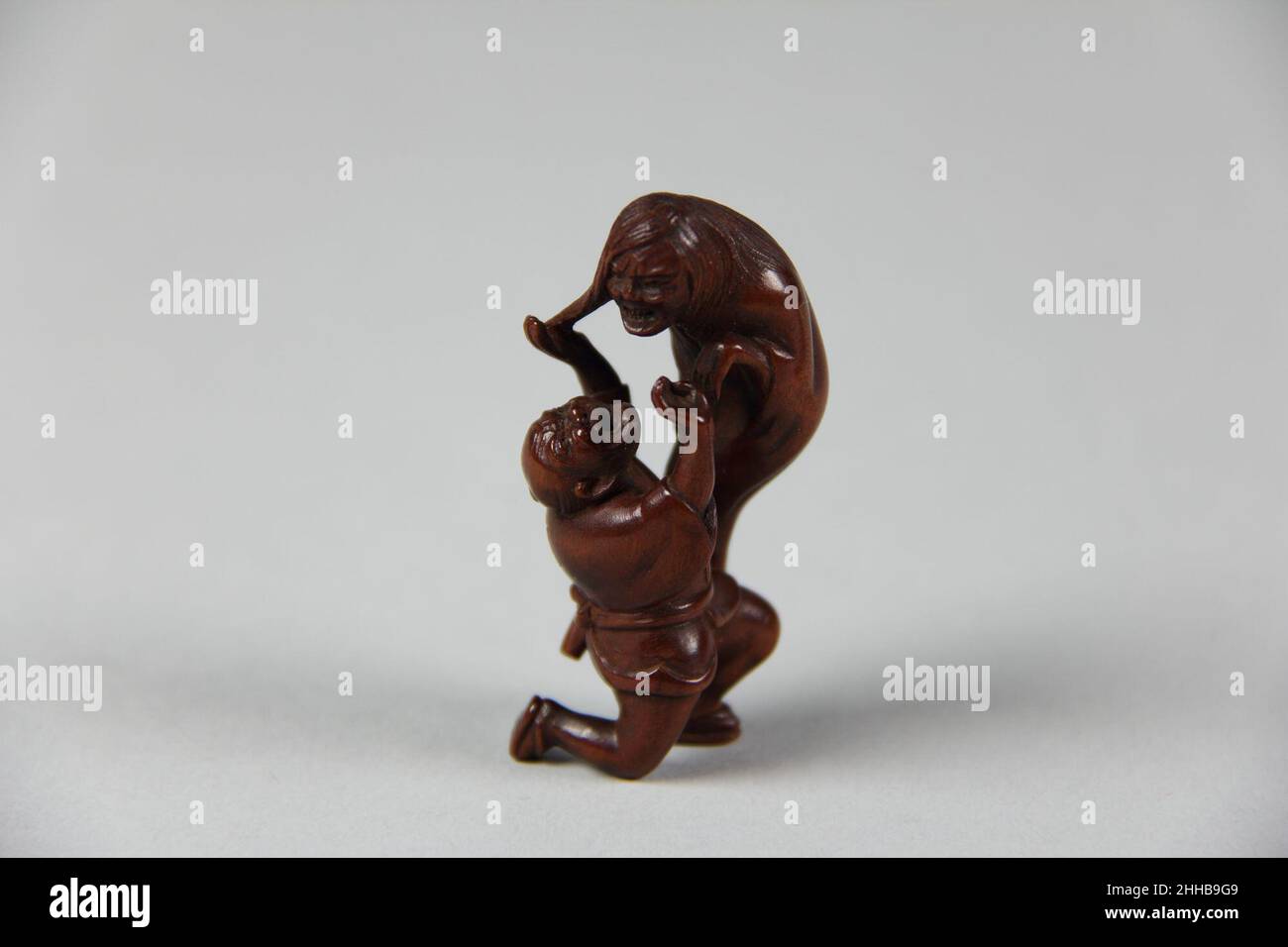 Netsuke of Ghost and Man on His Knees 19th century Japan. Netsuke of ...